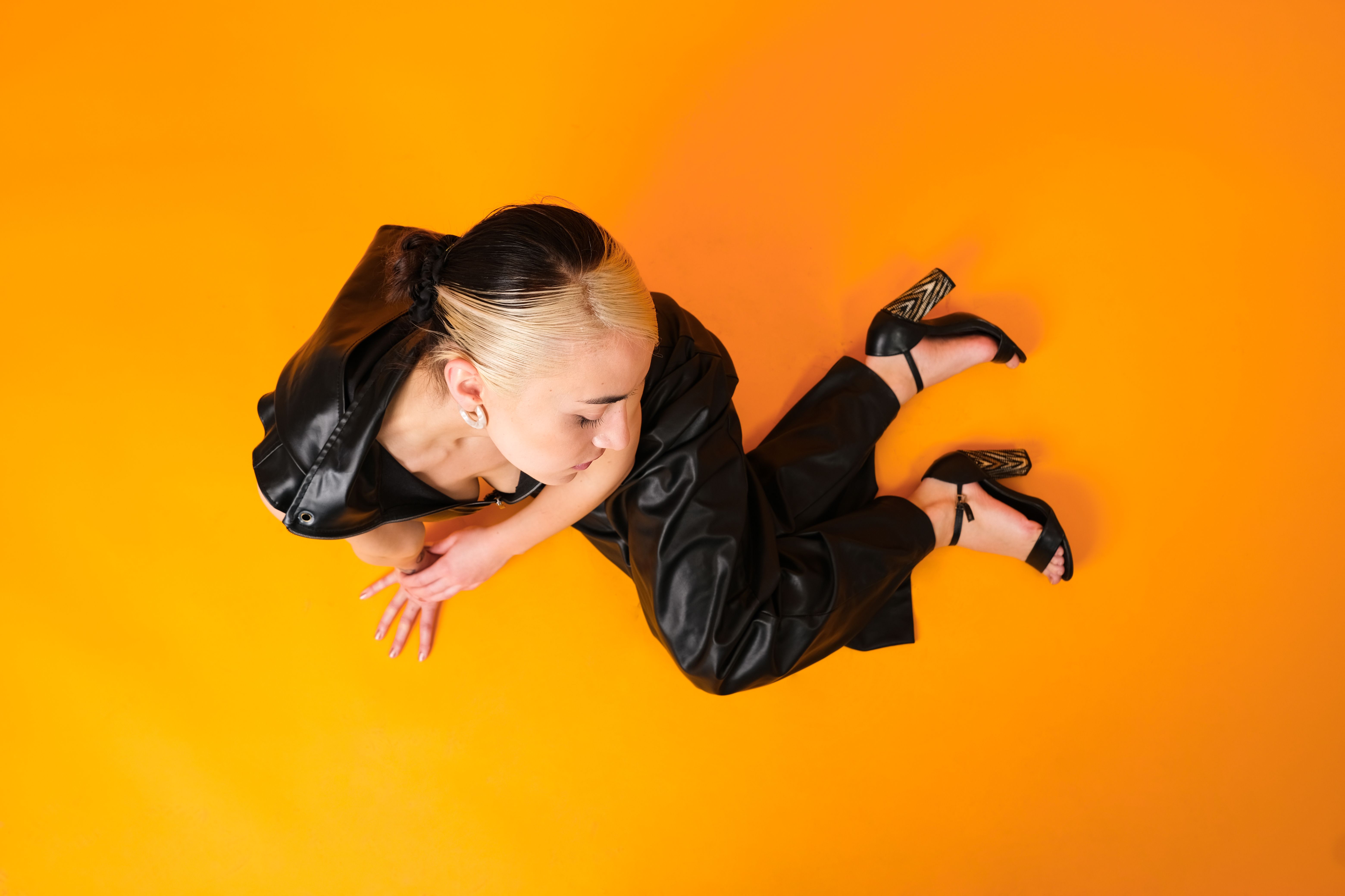 Top View of Woman Posing in Studio · Free Stock Photo
