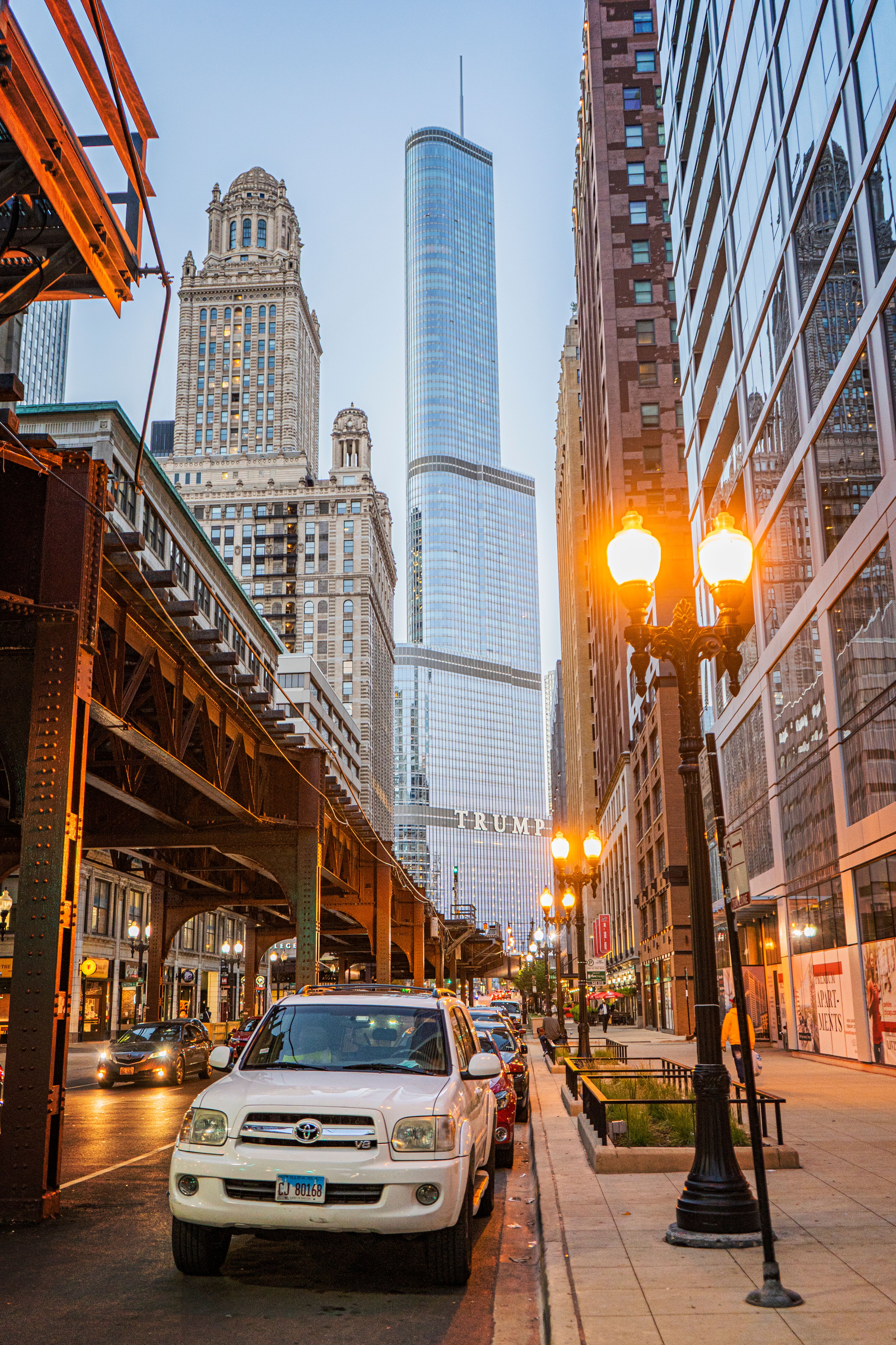 Cars Parked on Side of the Road in Between High Rise Buildings · Free ...