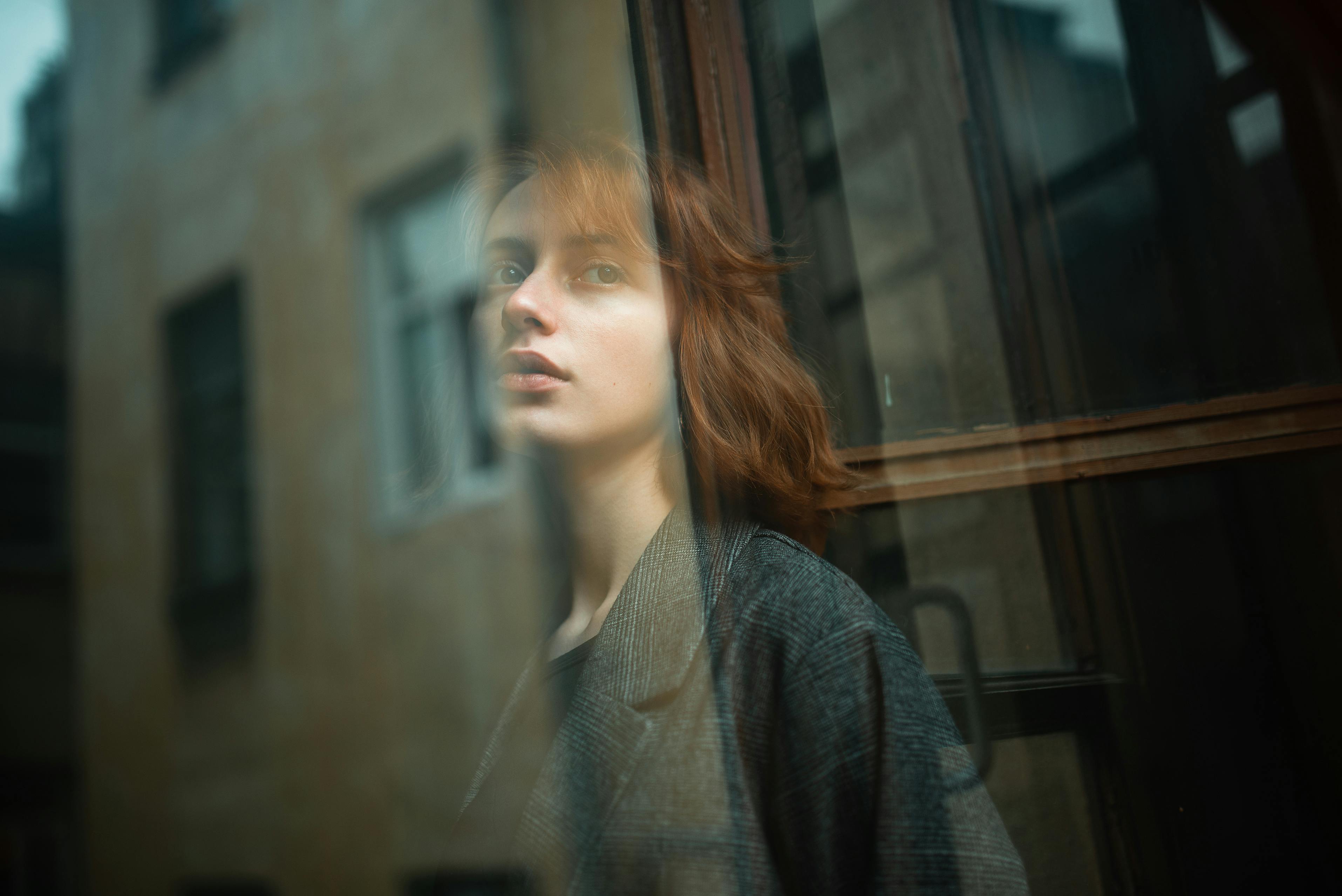 Photo of Woman Behind Glass · Free Stock Photo