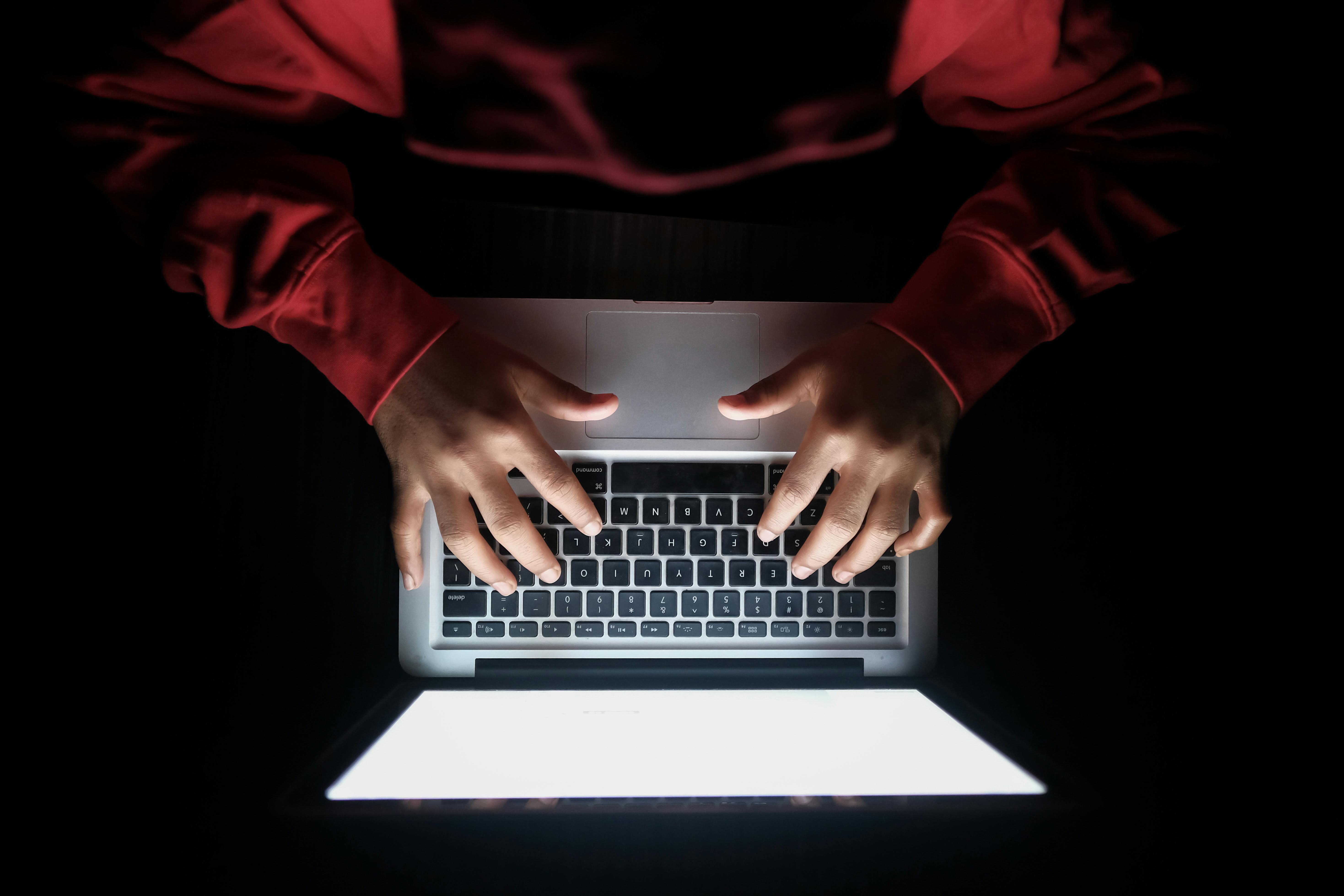 Skeleton Hands Typing in Laptop · Free Stock Photo
