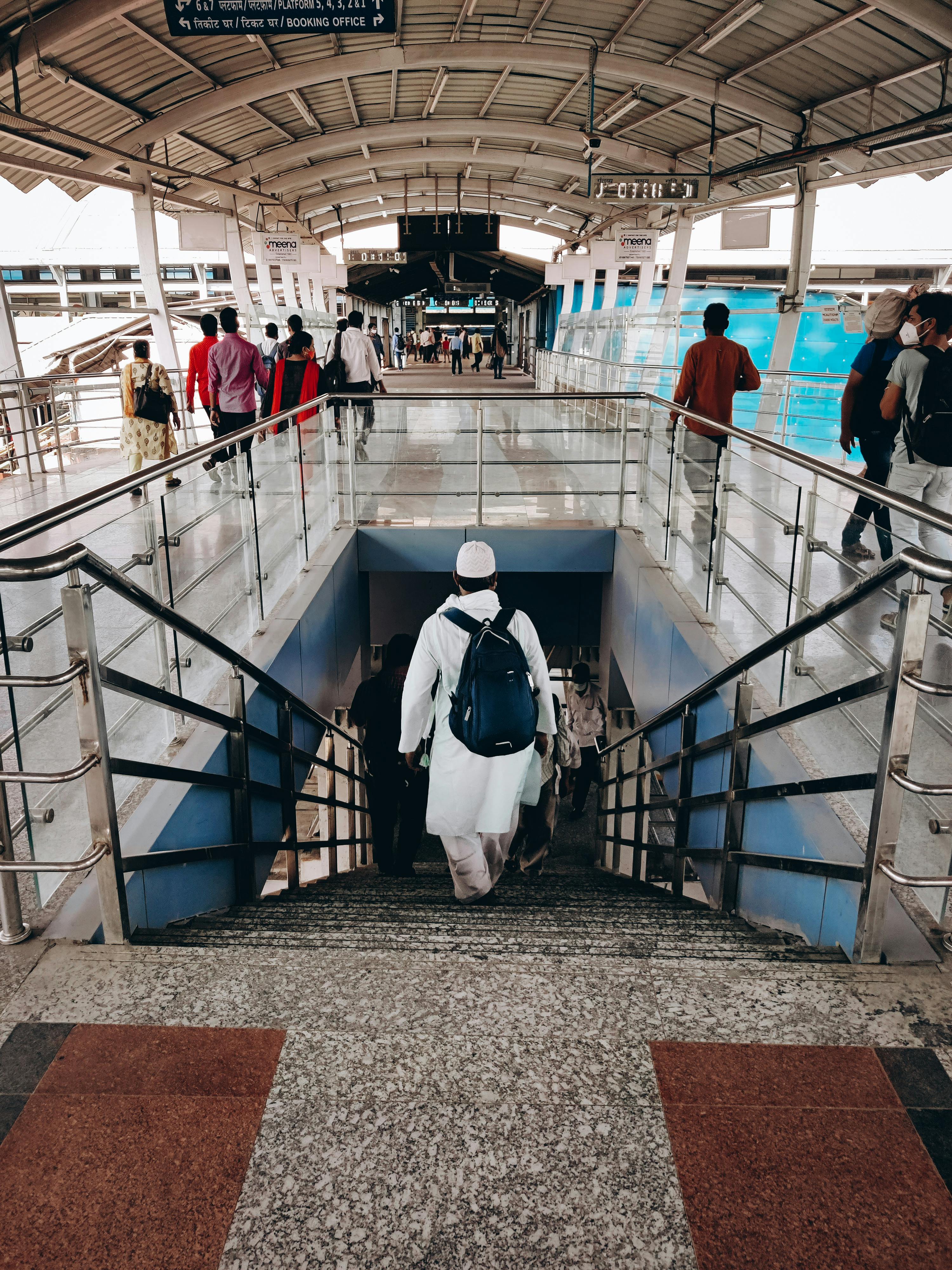 People Walking Beside Baggage Hall and Arrivals Hall Signage · Free ...