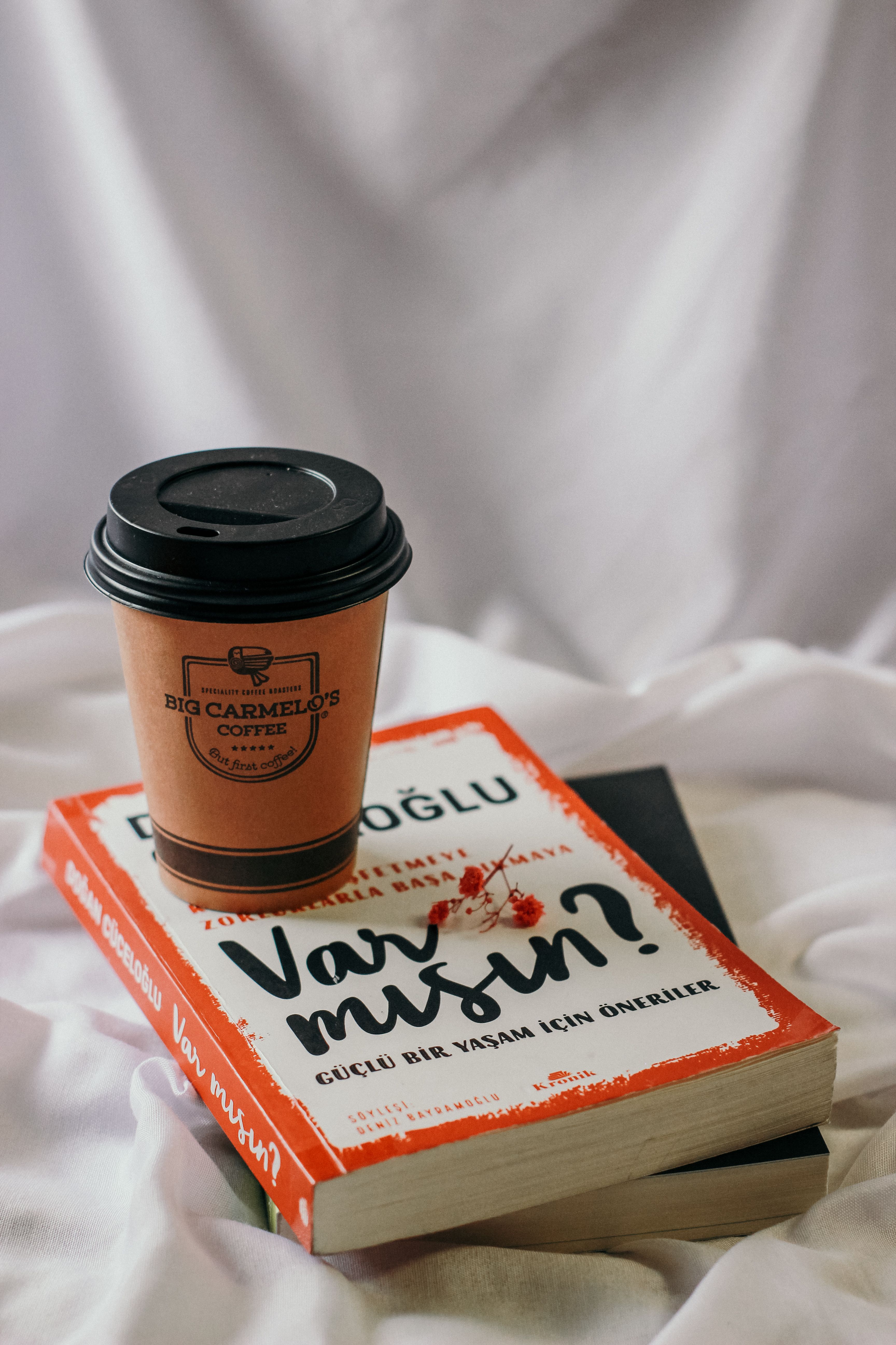 Coffee Cup on Books · Free Stock Photo