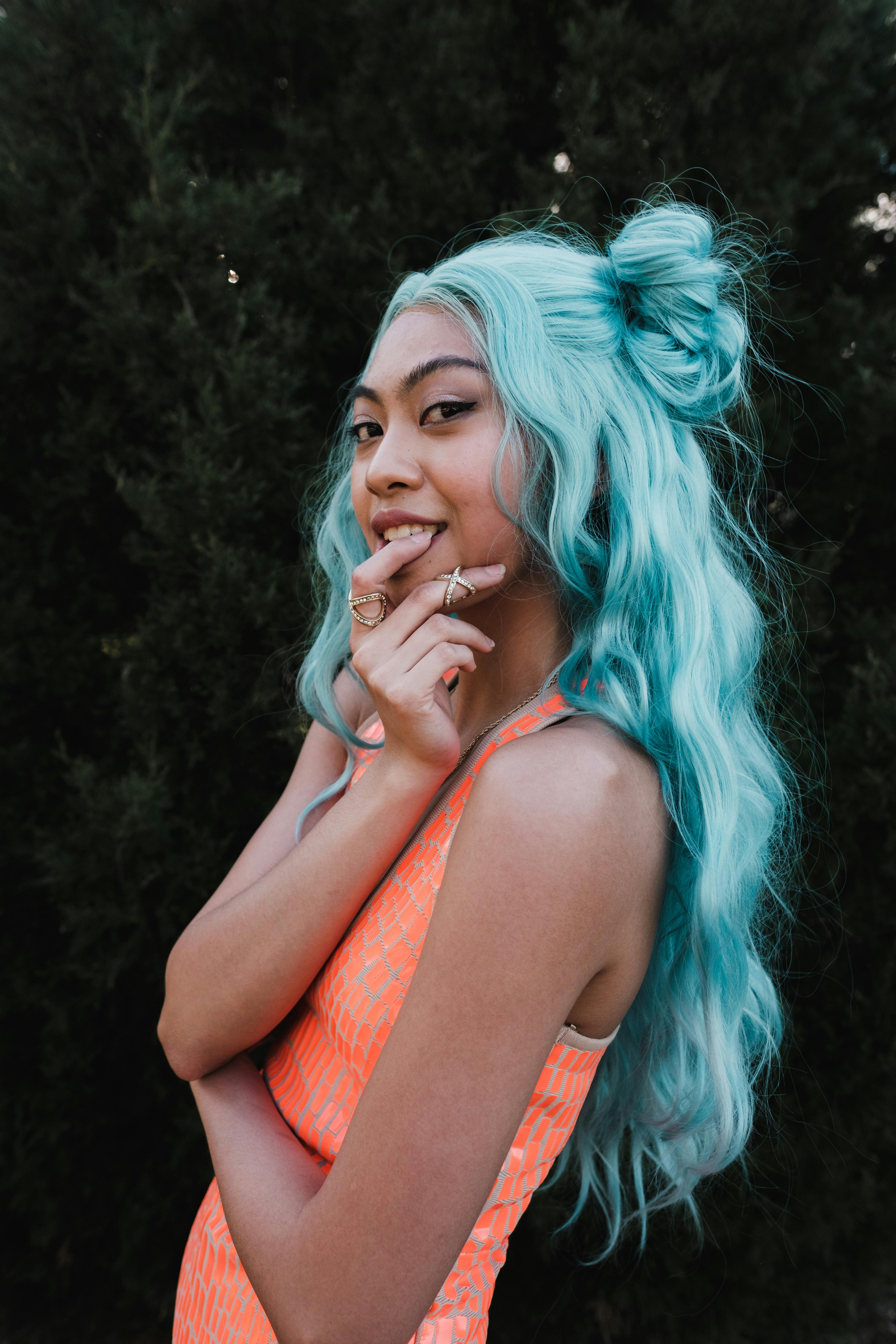 Close-Up Shot of a Woman with Blue Hair · Free Stock Photo