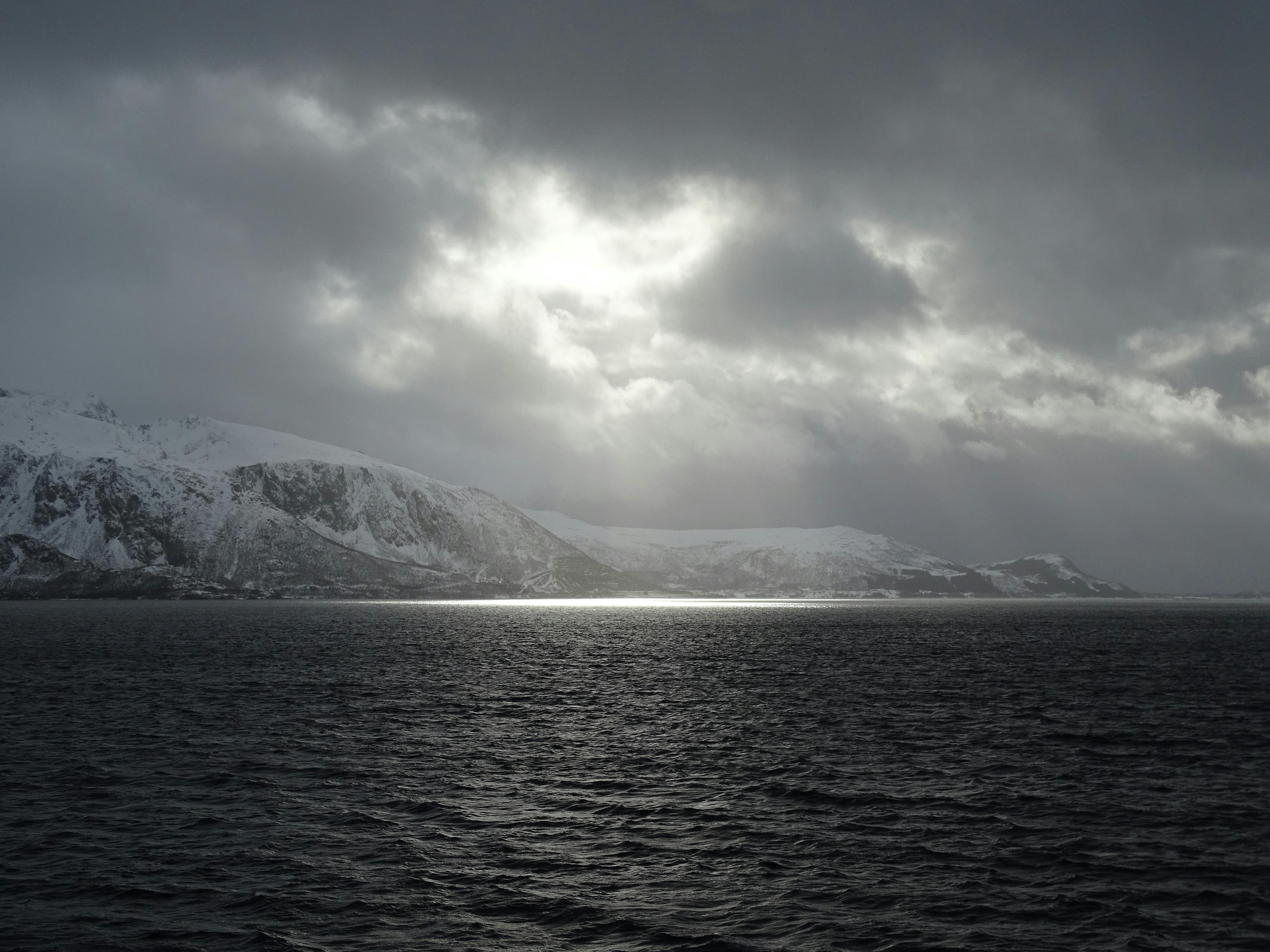 Snow Covered Mountain Near Body of Water · Free Stock Photo