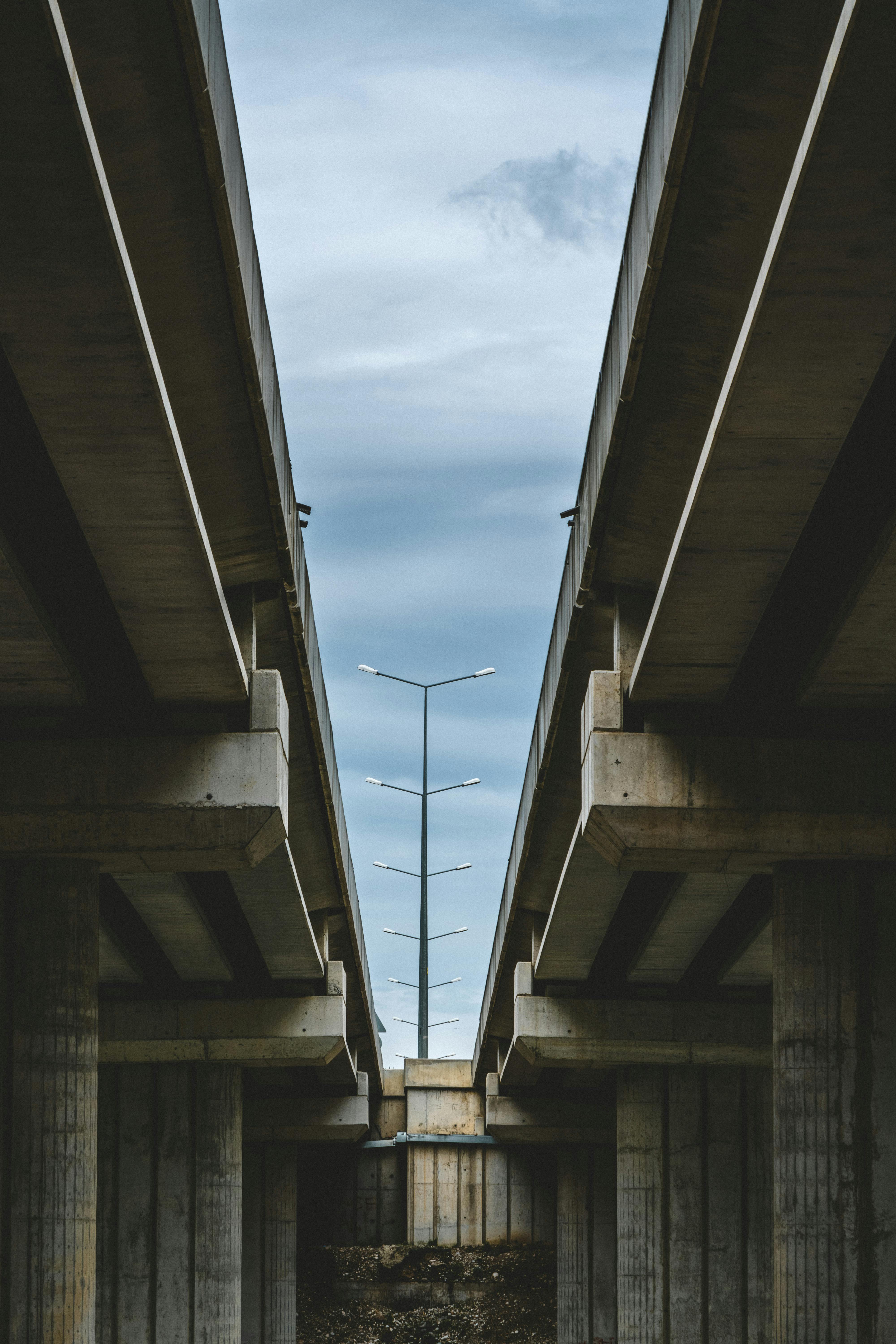Pathway Under a Concrete Bridge · Free Stock Photo