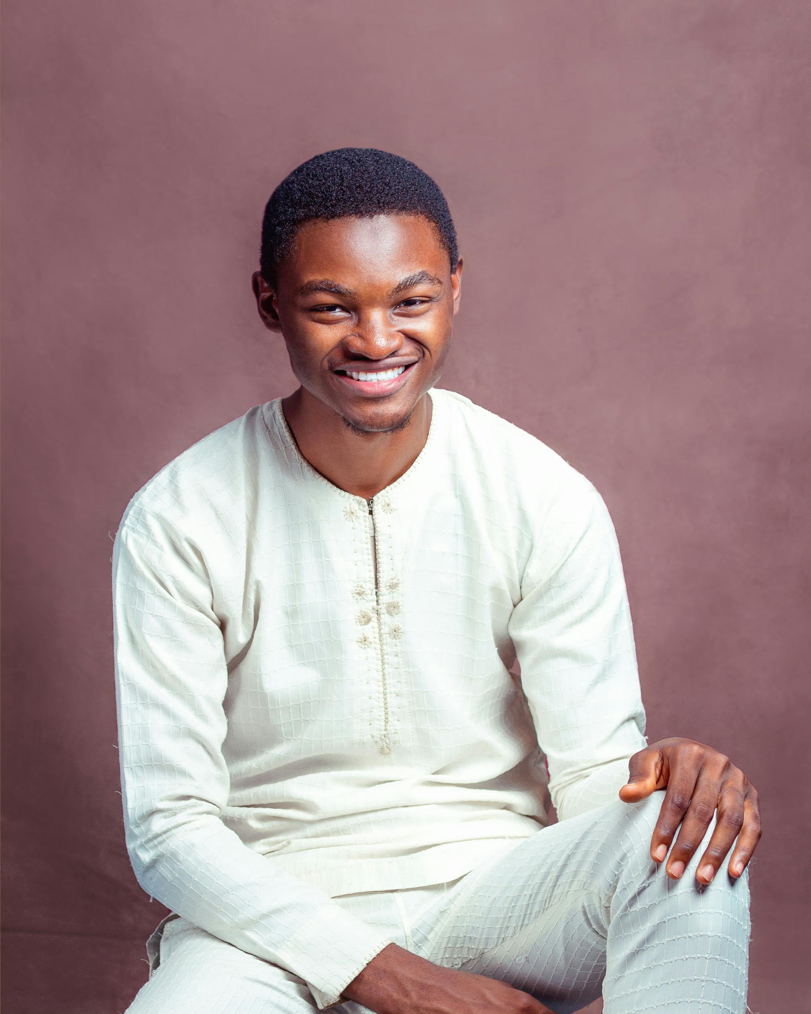 Man Wearing White Clothes Smiling · Free Stock Photo