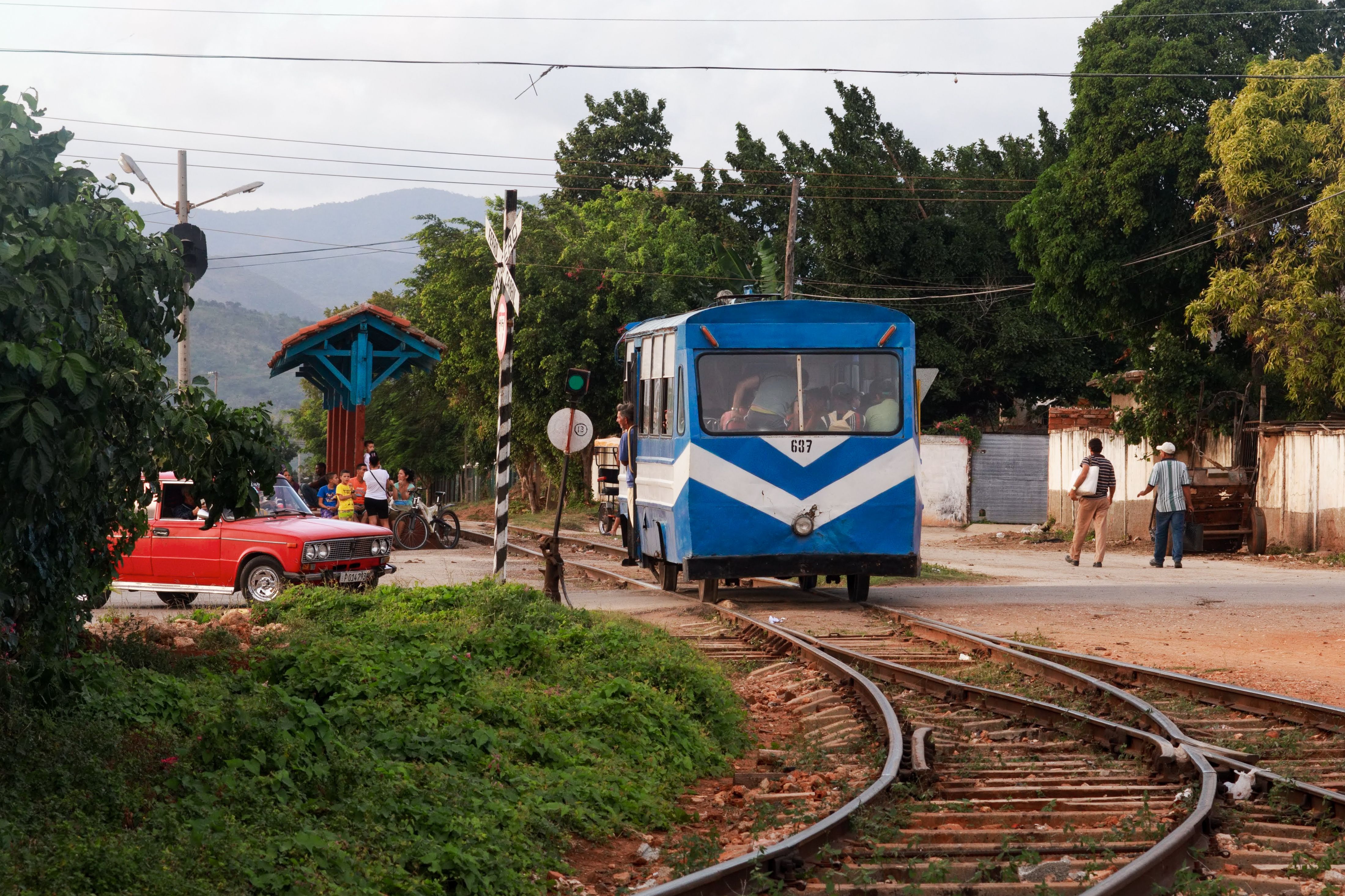 Blue Train on Rail Tracks · Free Stock Photo