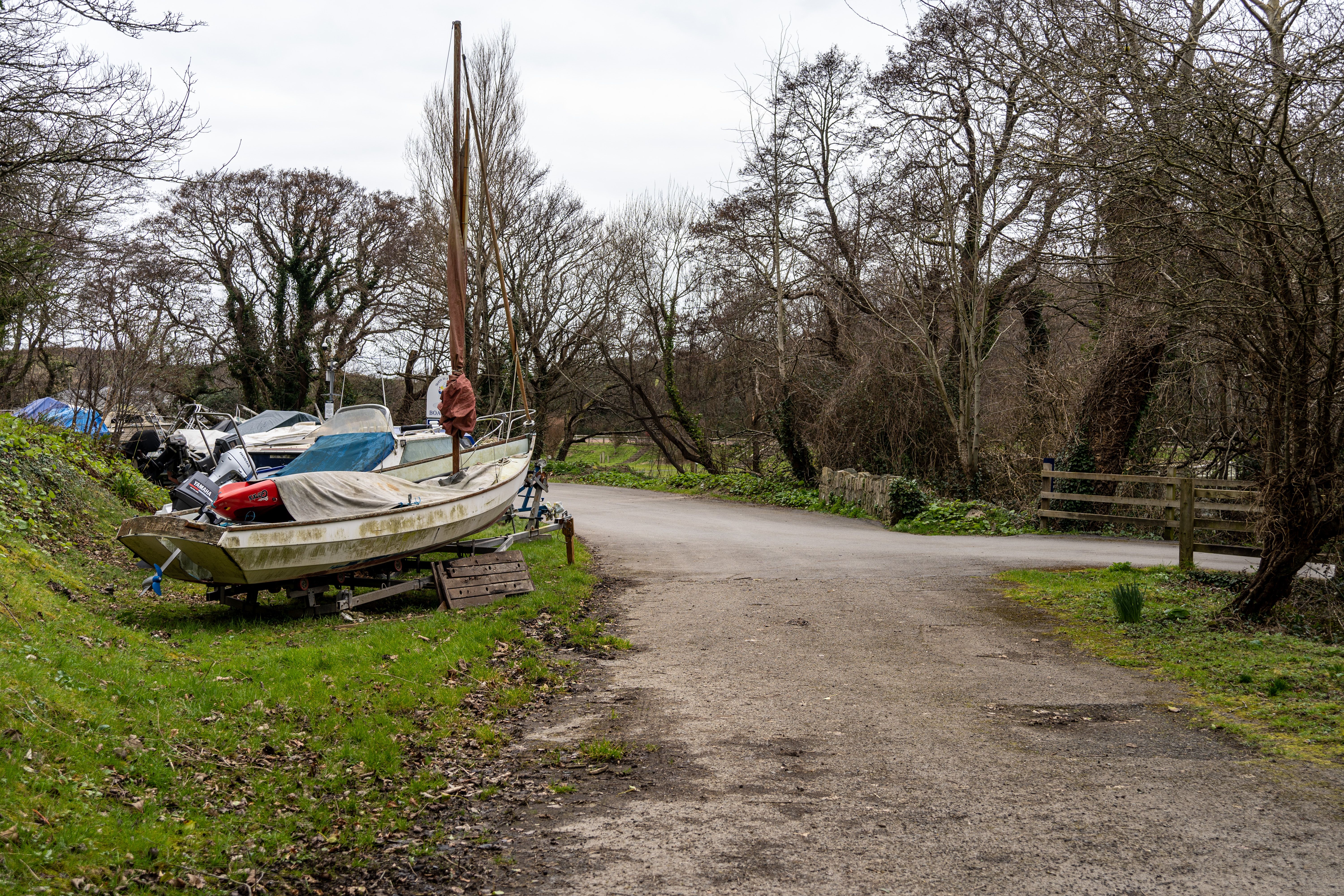 Country Road and Boats · Free Stock Photo