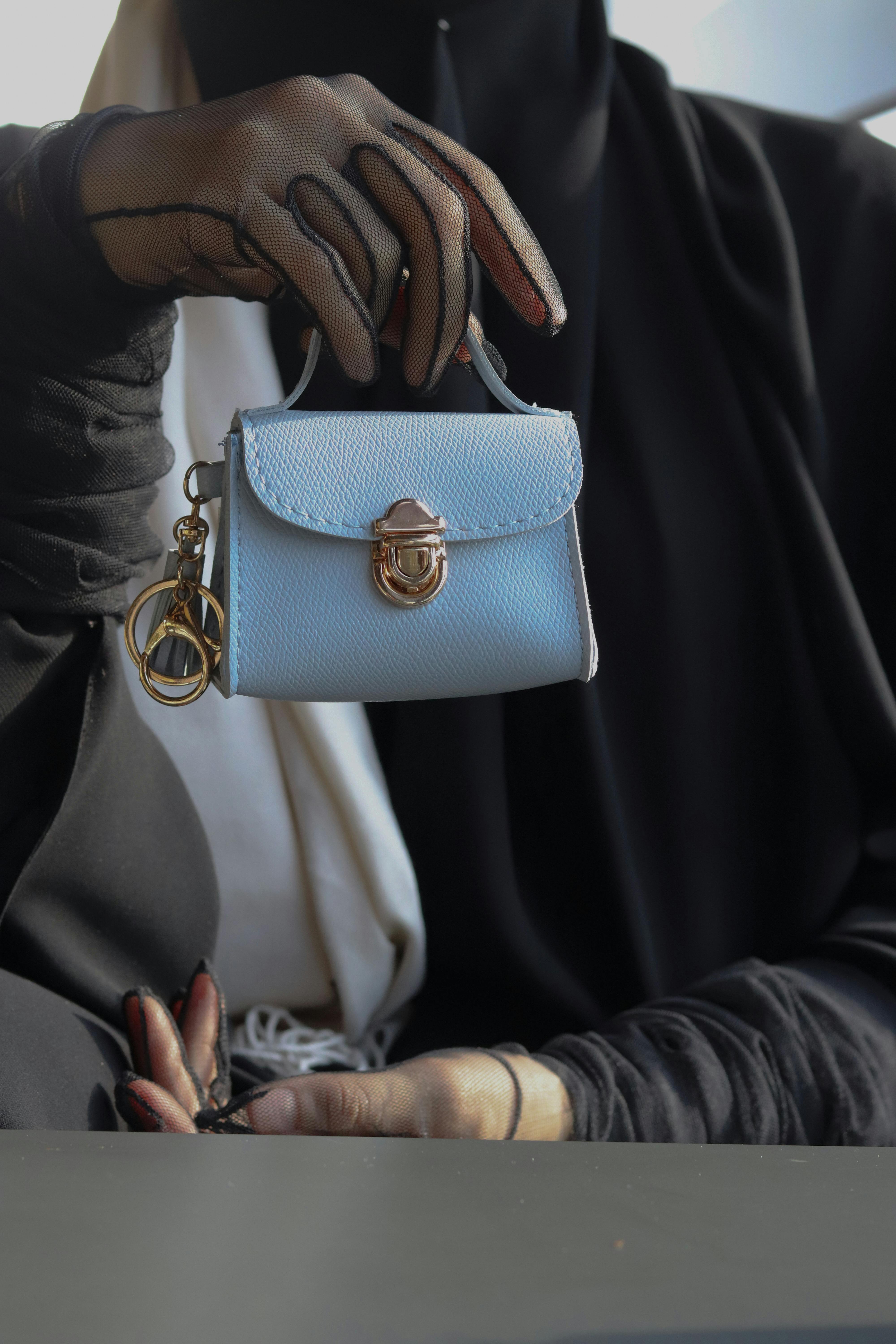 Person Holding White Small Bag · Free Stock Photo