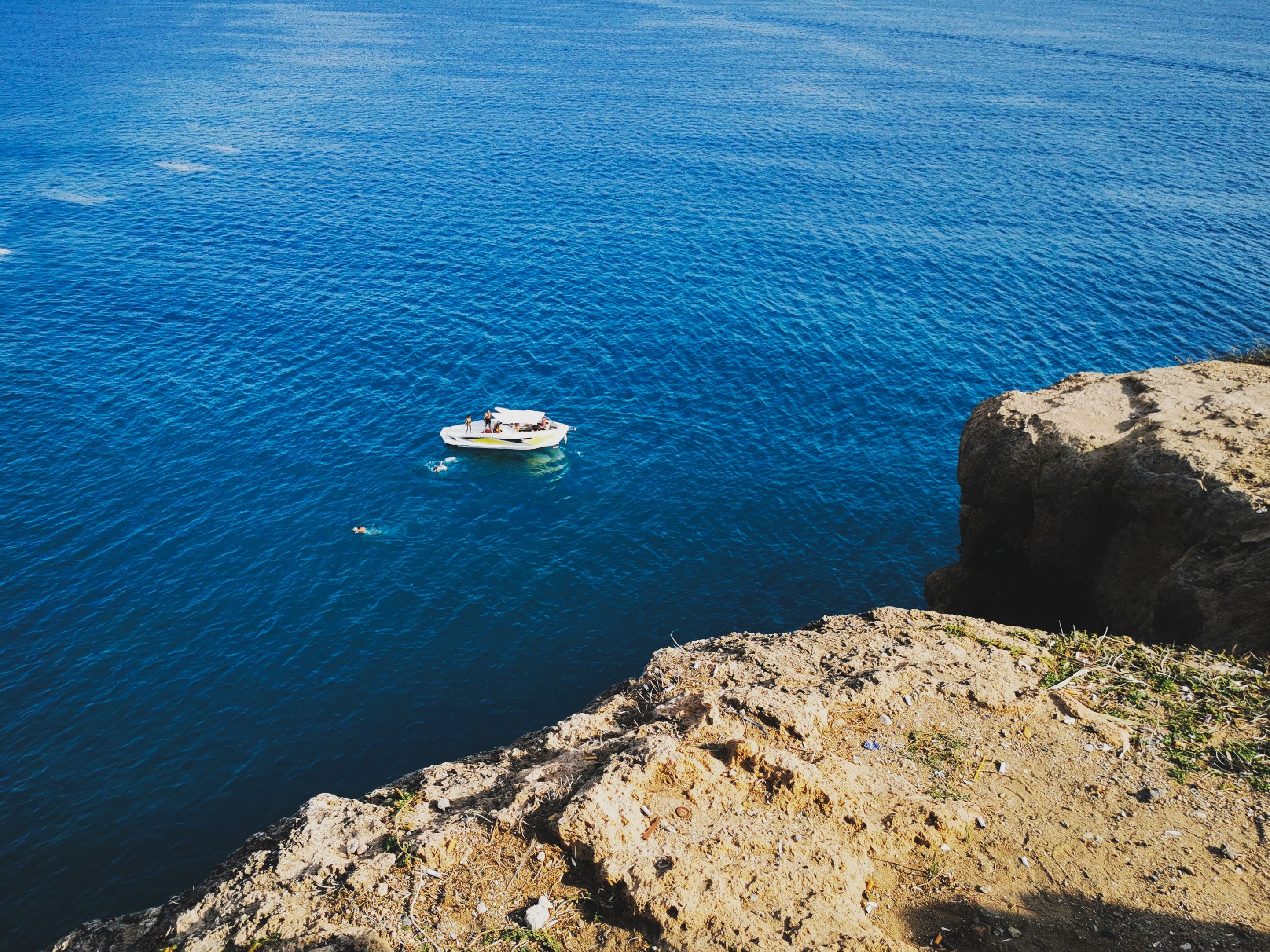 People Fishing while Riding on a Yacht · Free Stock Photo