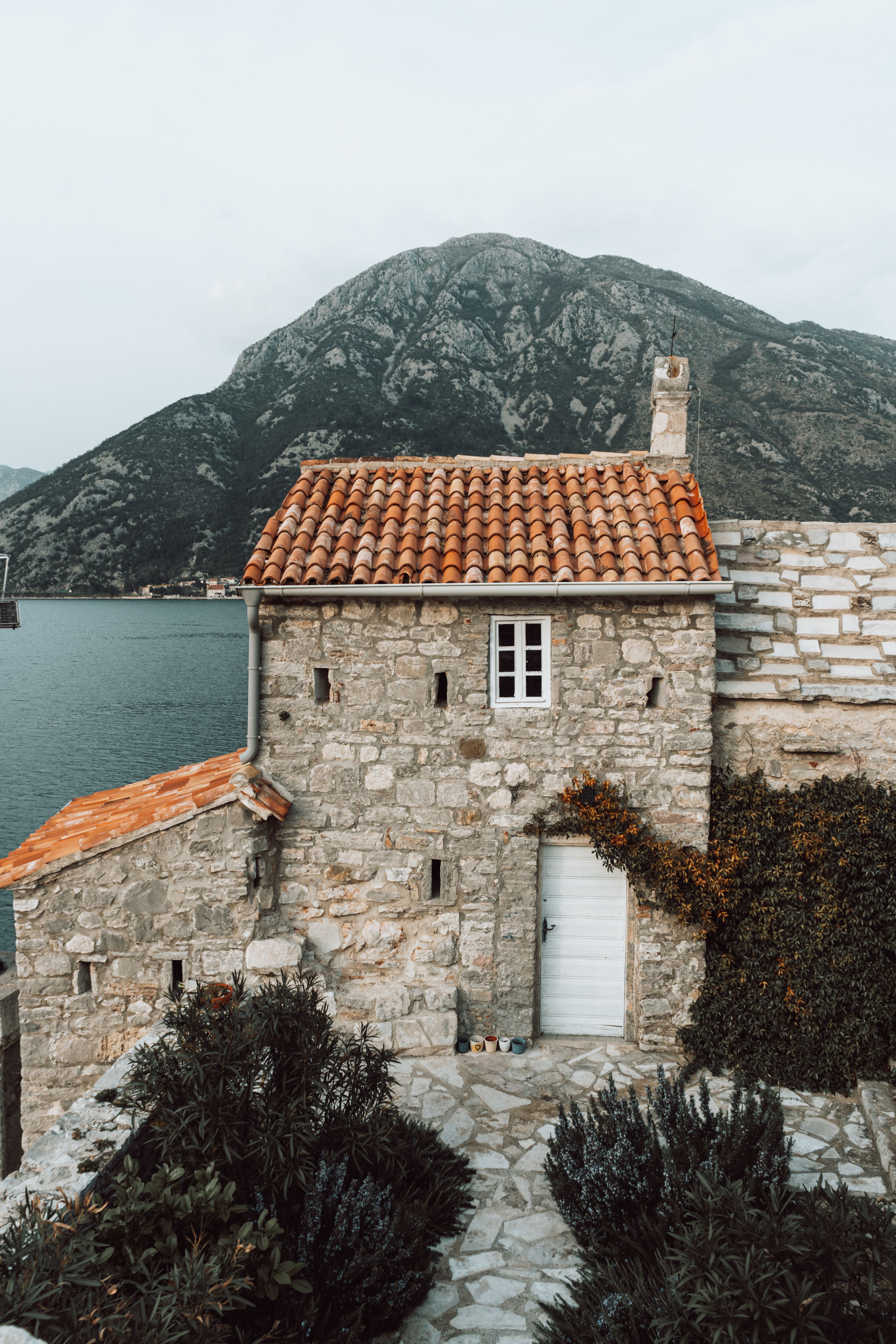 Stone House at Lake in Historical Architecture · Free Stock Photo