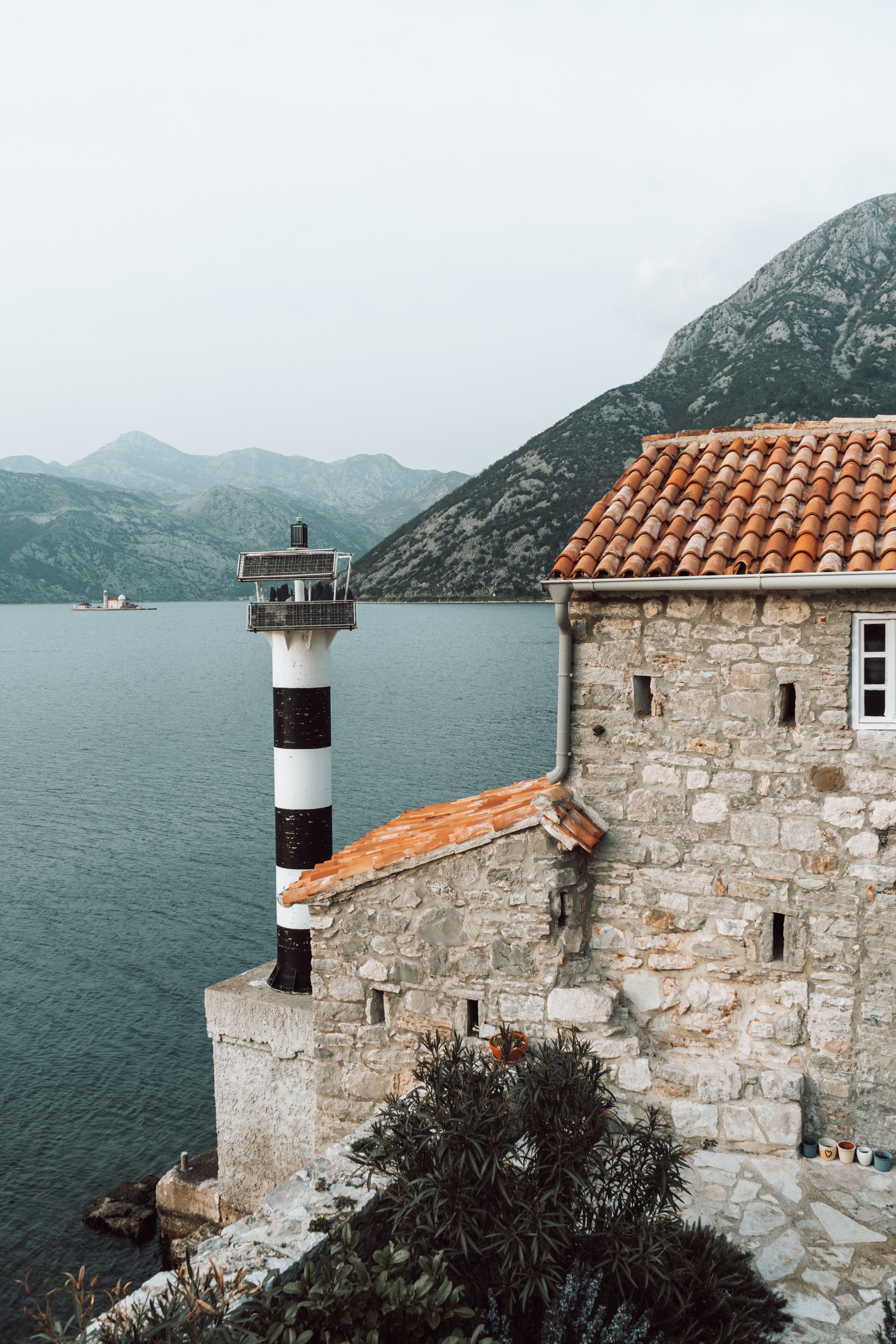 Stone House on Lake Shore · Free Stock Photo