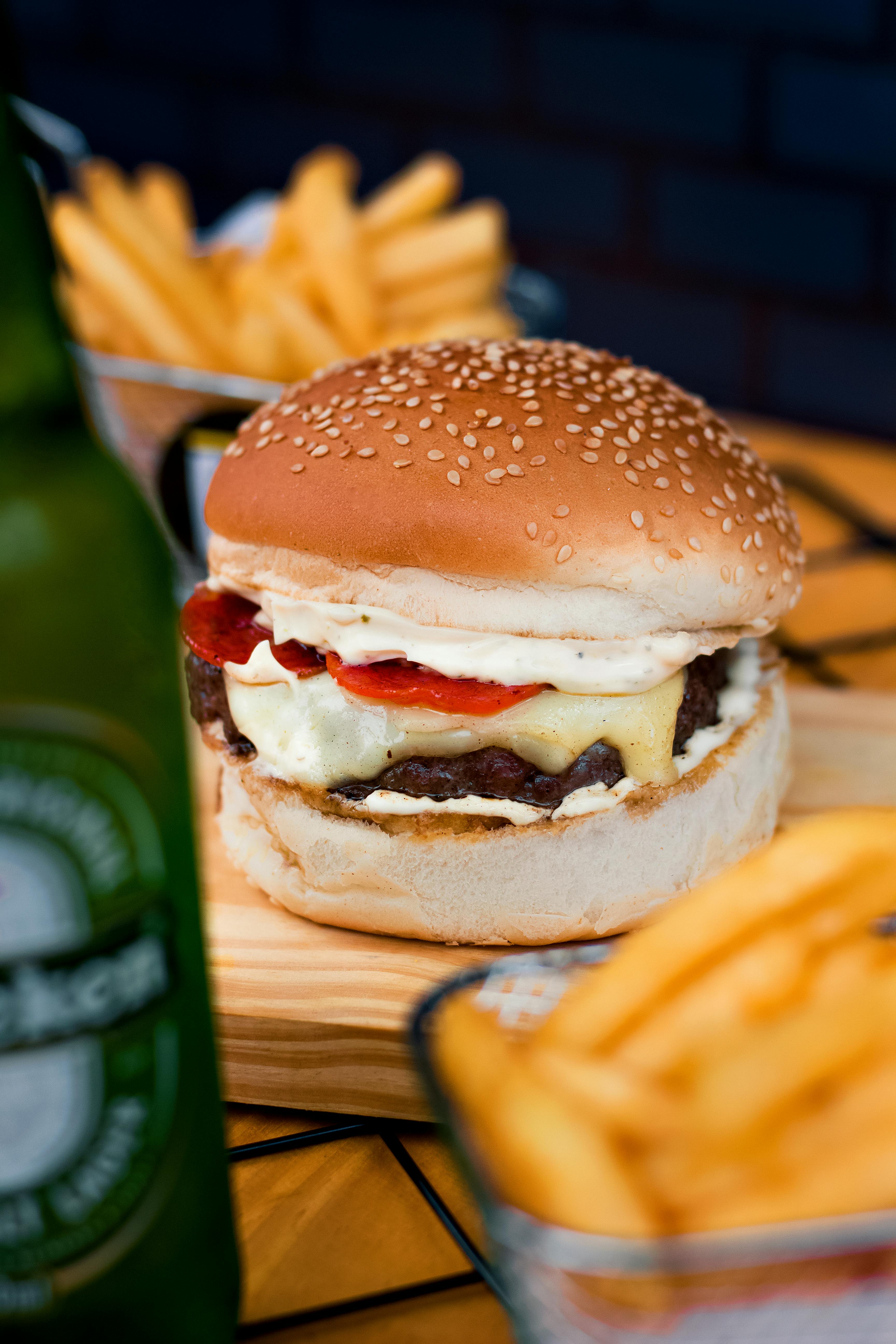 A Close-Up Shot of a Delicious Burger · Free Stock Photo