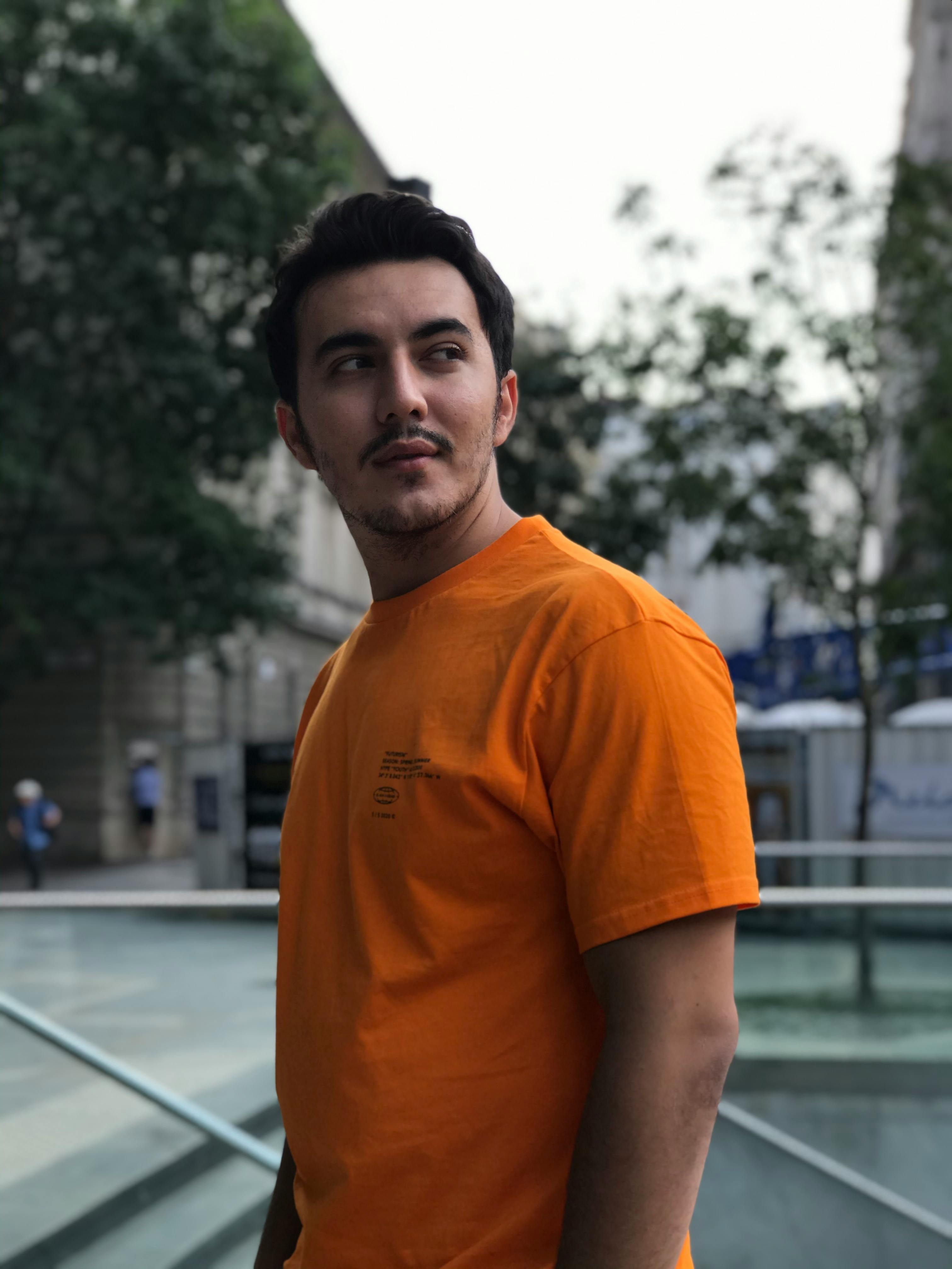 Man Wearing Orange Shirt · Free Stock Photo