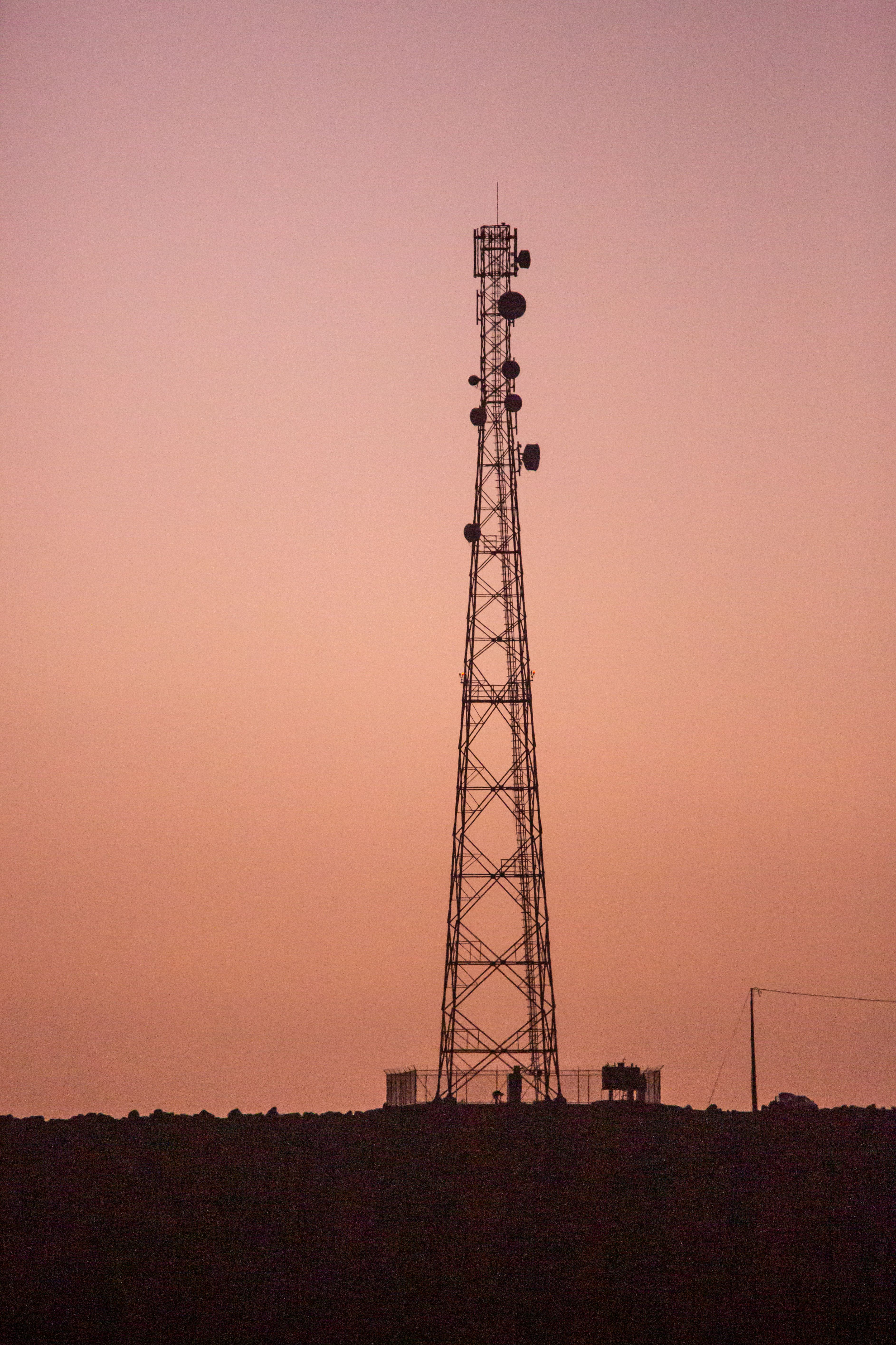Telecommunication Tower with Dark Sky · Free Stock Photo