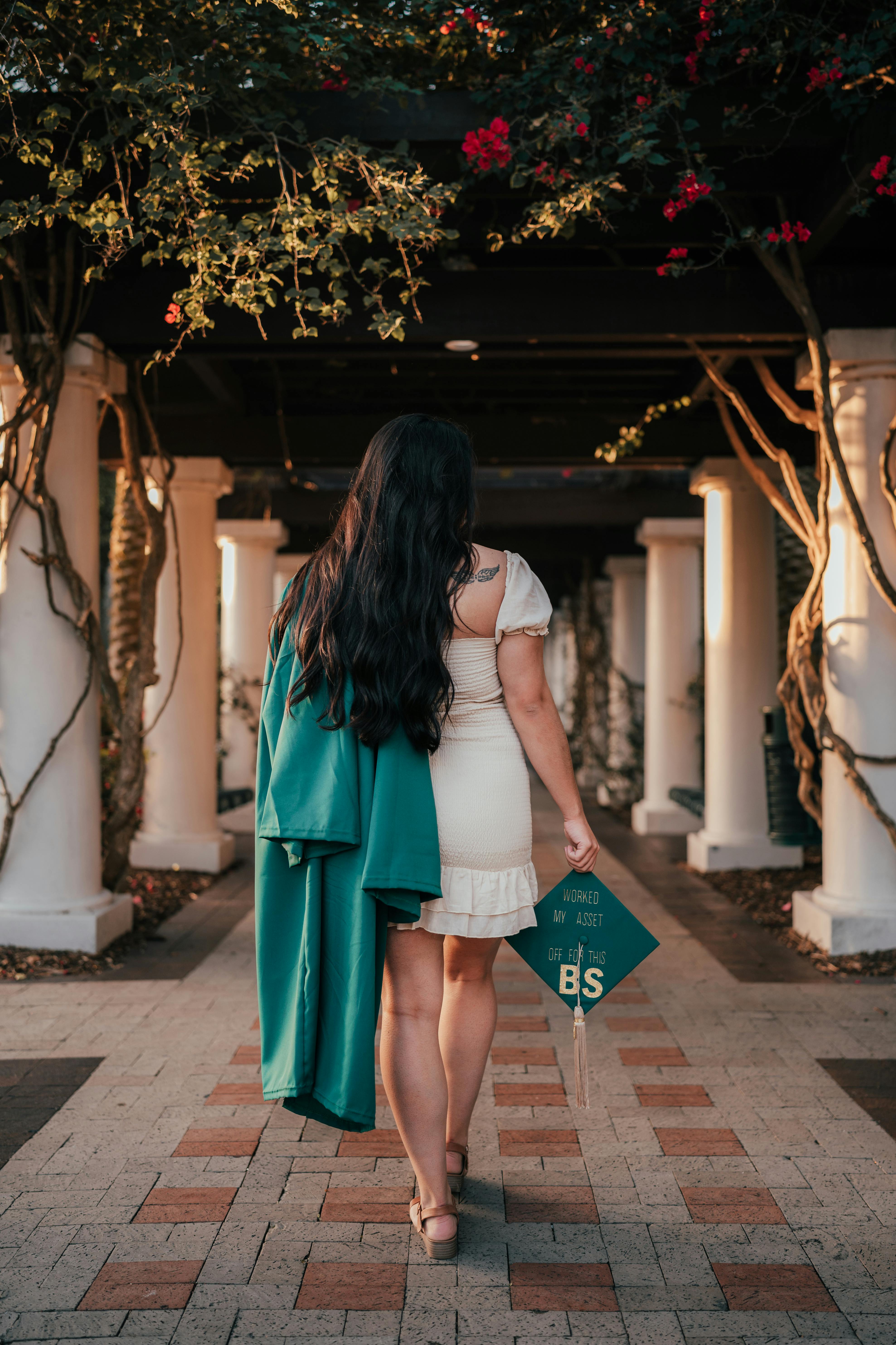 Young Graduates Holding Their Diplomas · Free Stock Photo