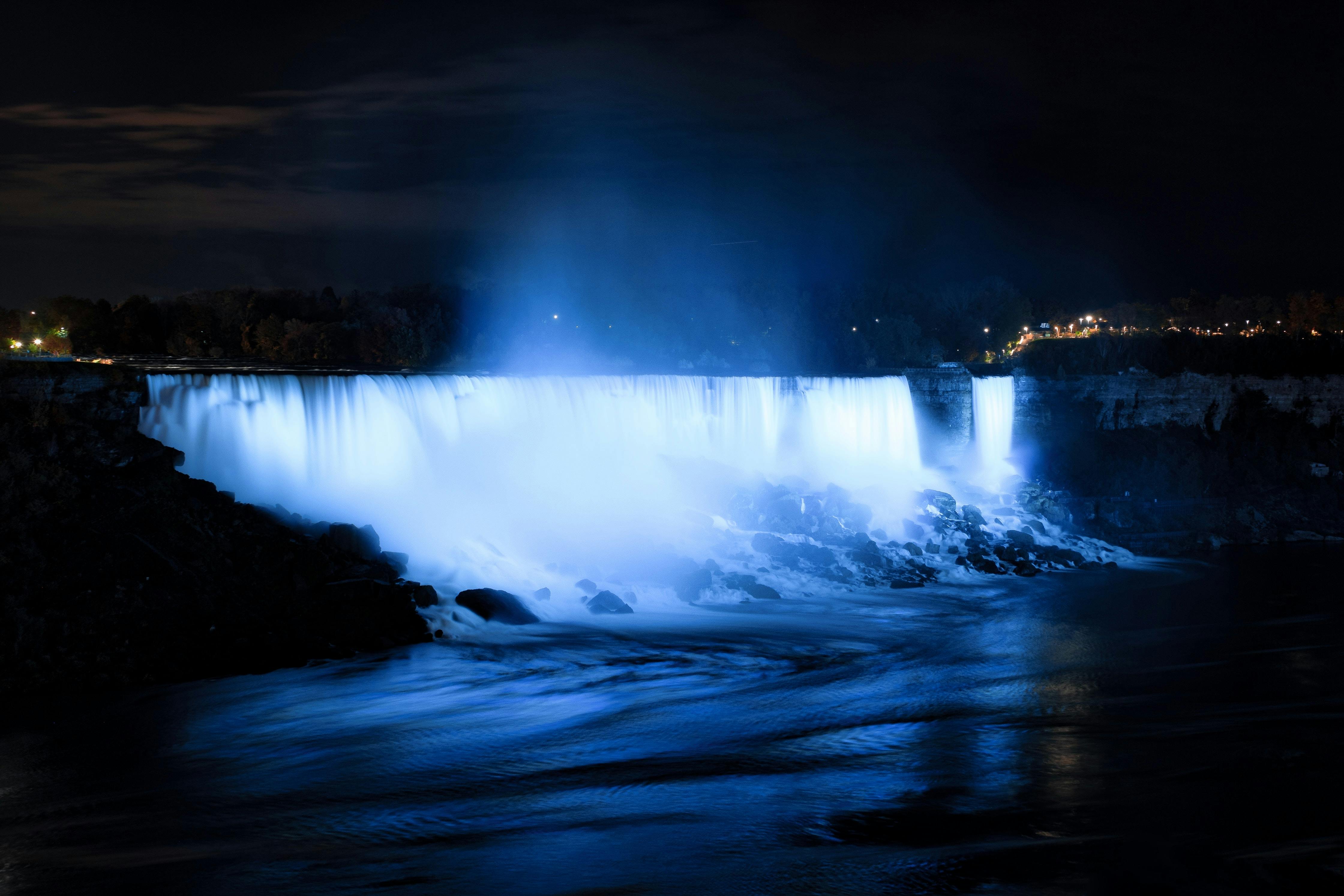 Illuminated Waterfall at Night · Free Stock Photo