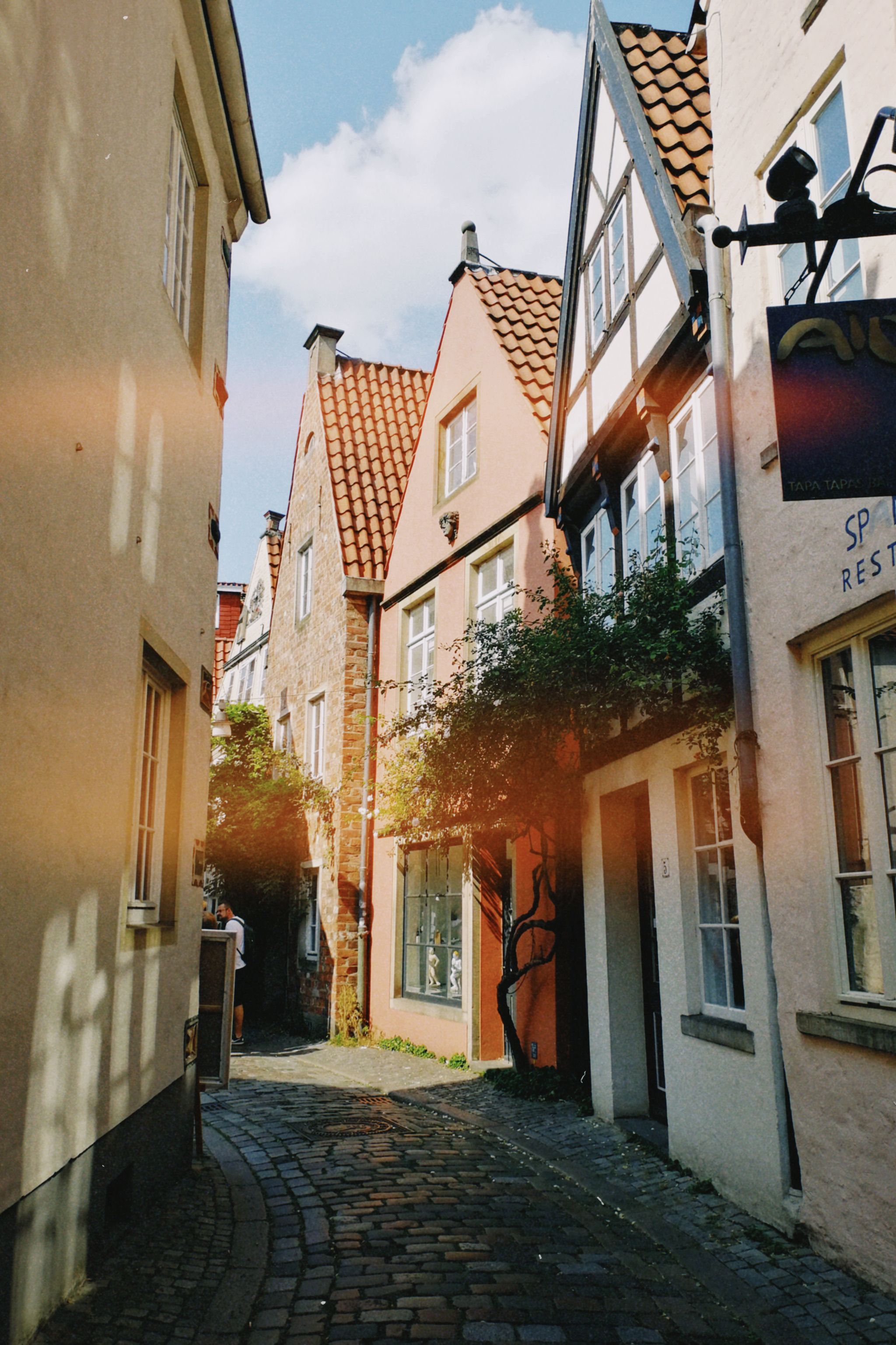 An Alley between Houses during the Day · Free Stock Photo
