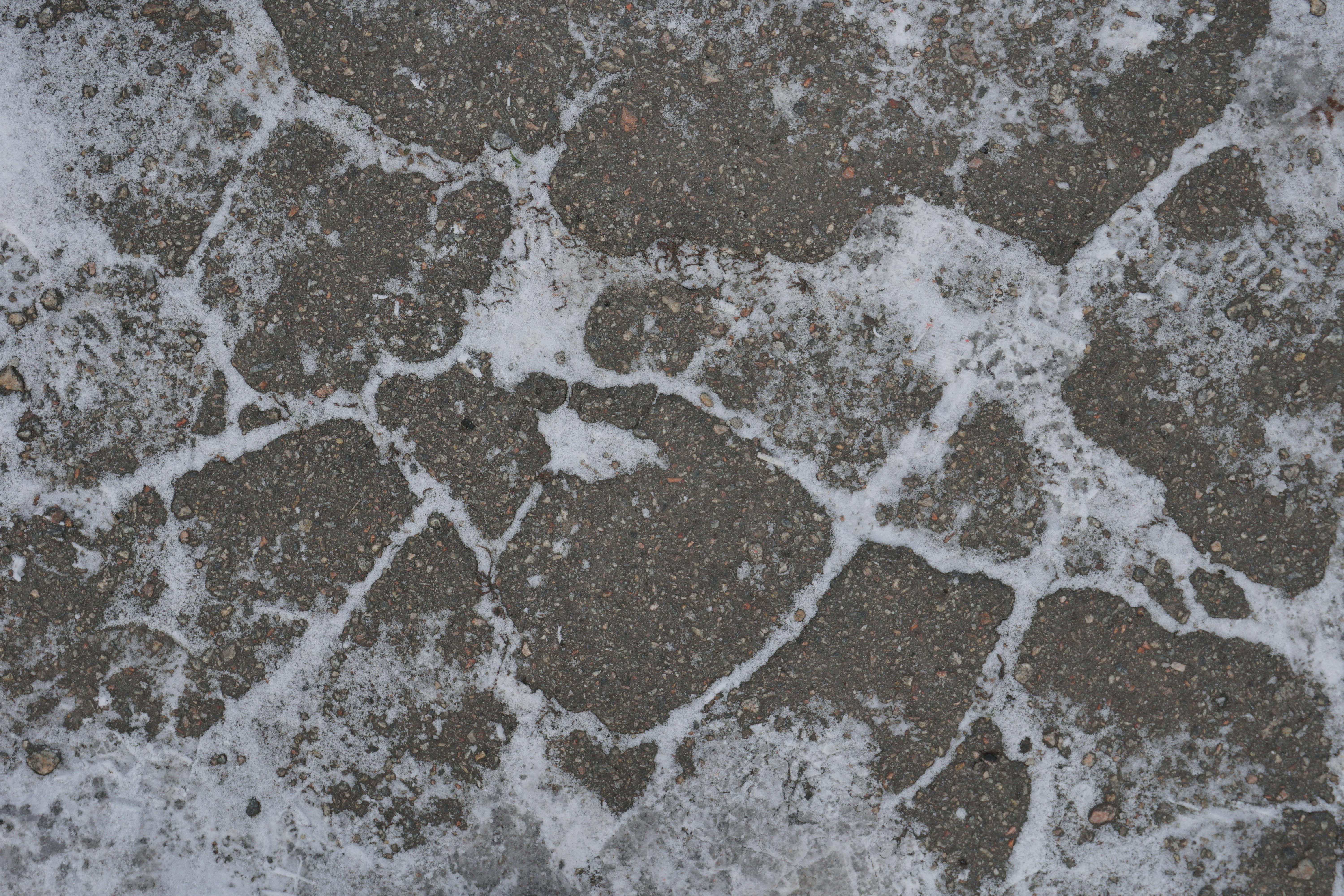 A Snow Covered Cobblestone Floor During Winter · Free Stock Photo