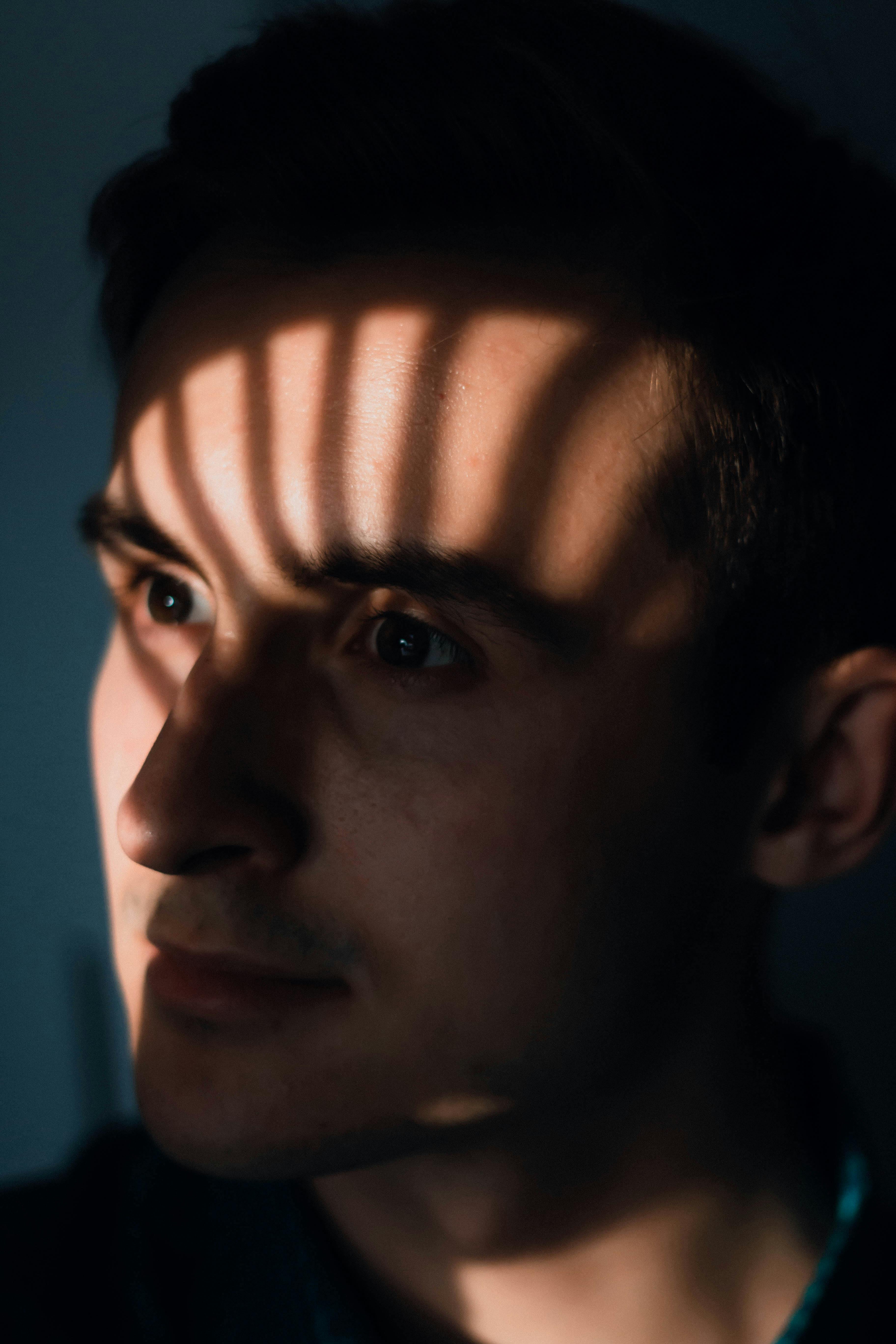 Close-Up Shot of a Man Crying · Free Stock Photo