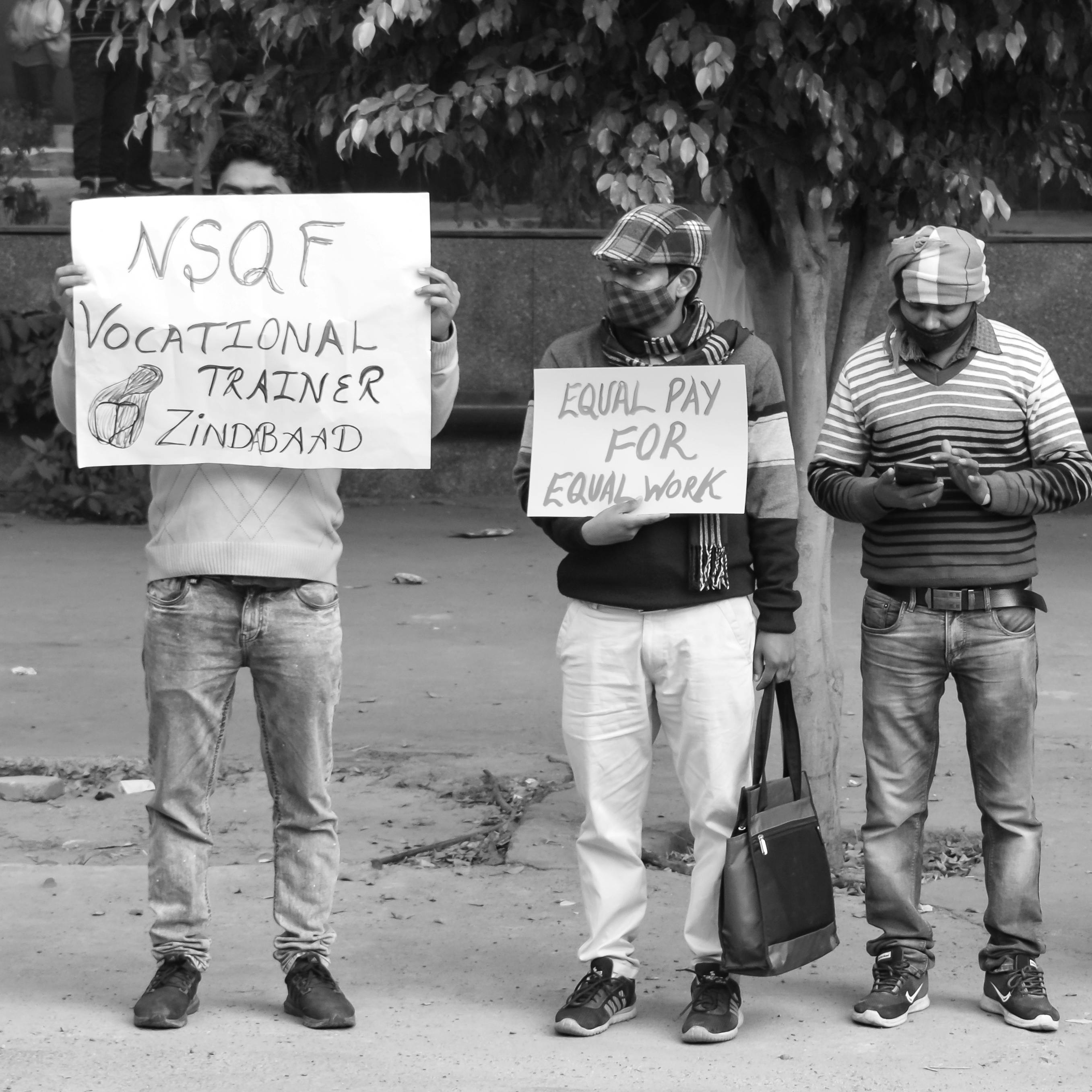 A Grayscale of Men during a Protest · Free Stock Photo
