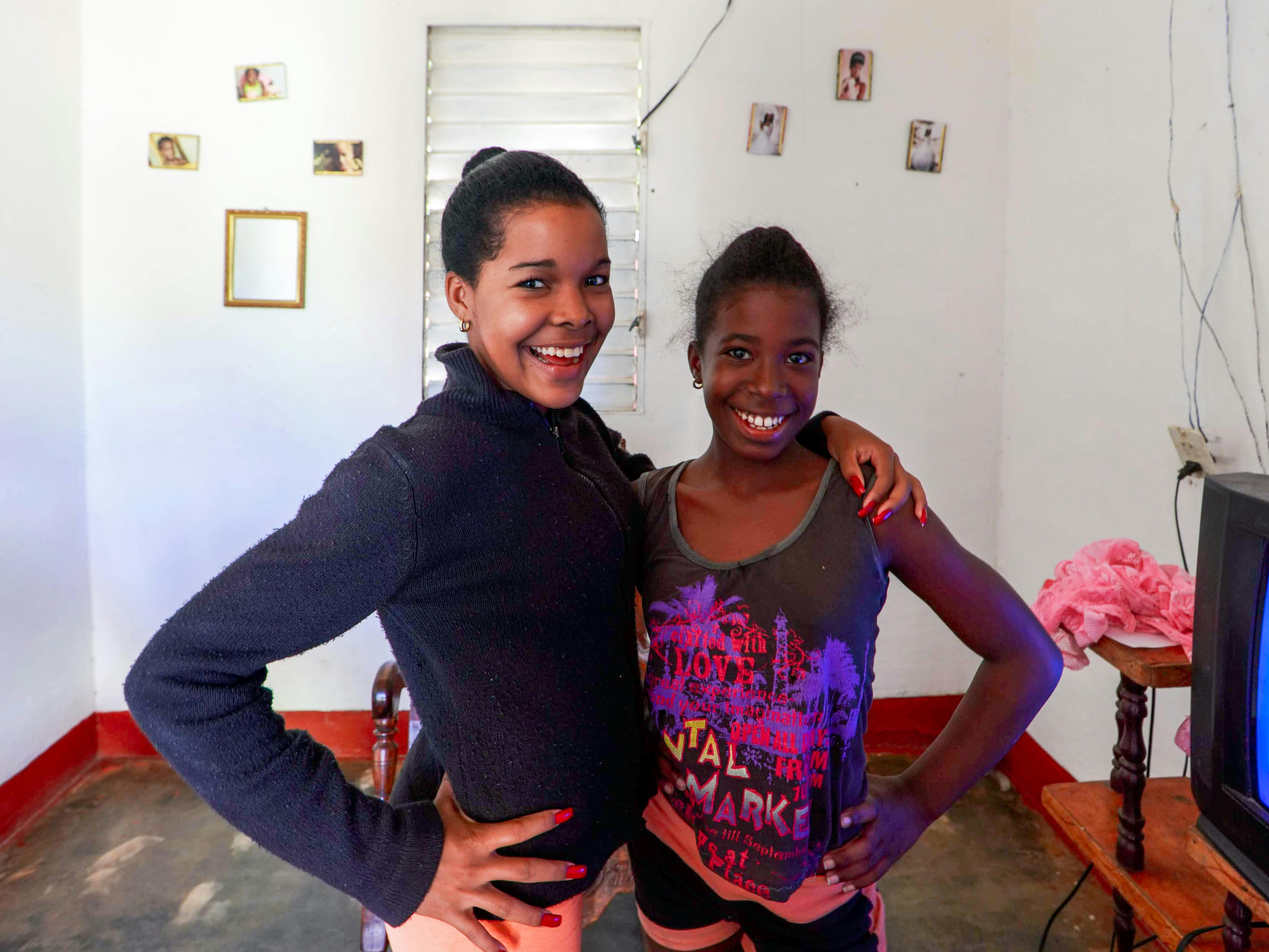 A Woman Smiling while Dancing · Free Stock Photo