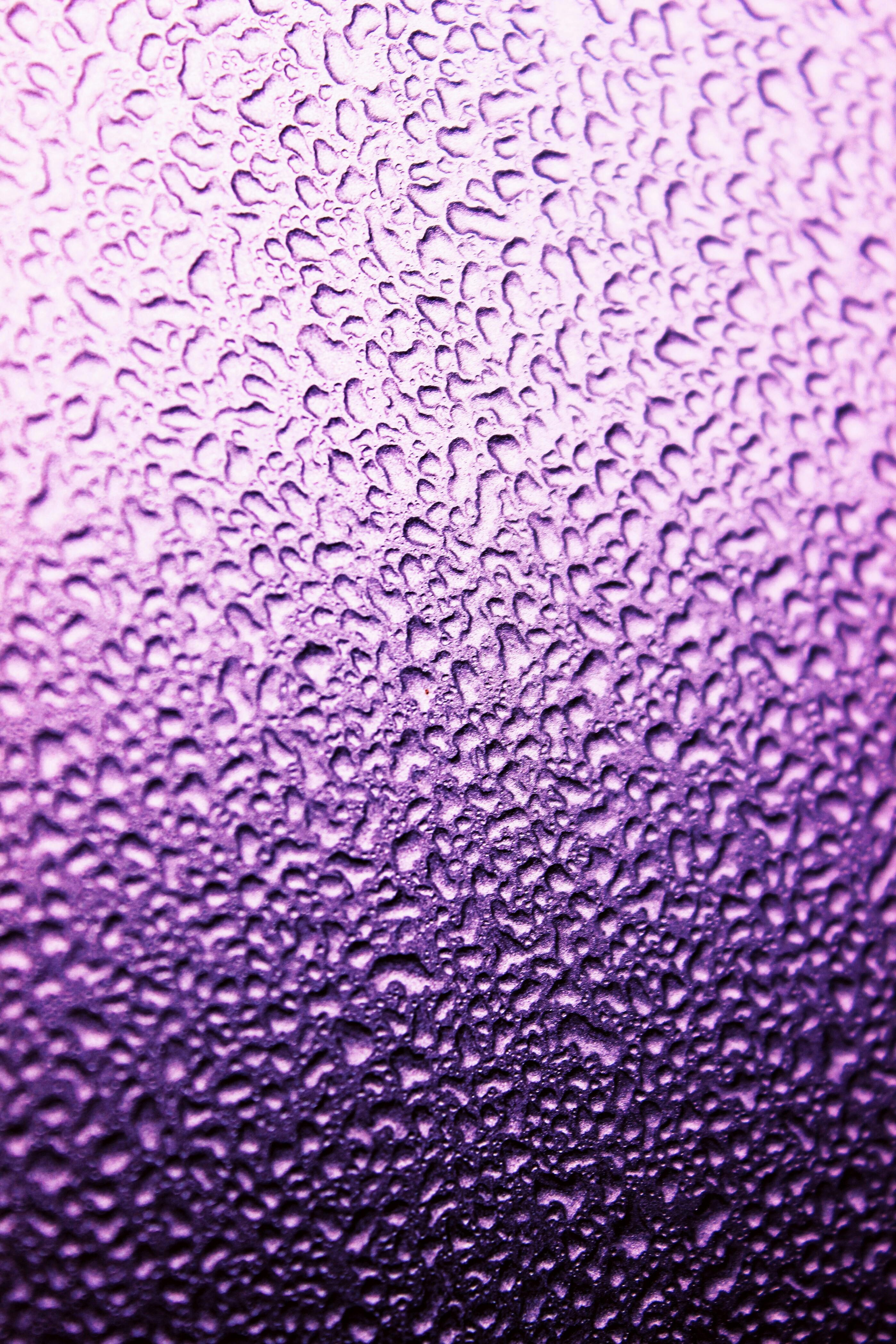 Close-up of Rings Formed on a Water Surface from a Water Droplet · Free ...