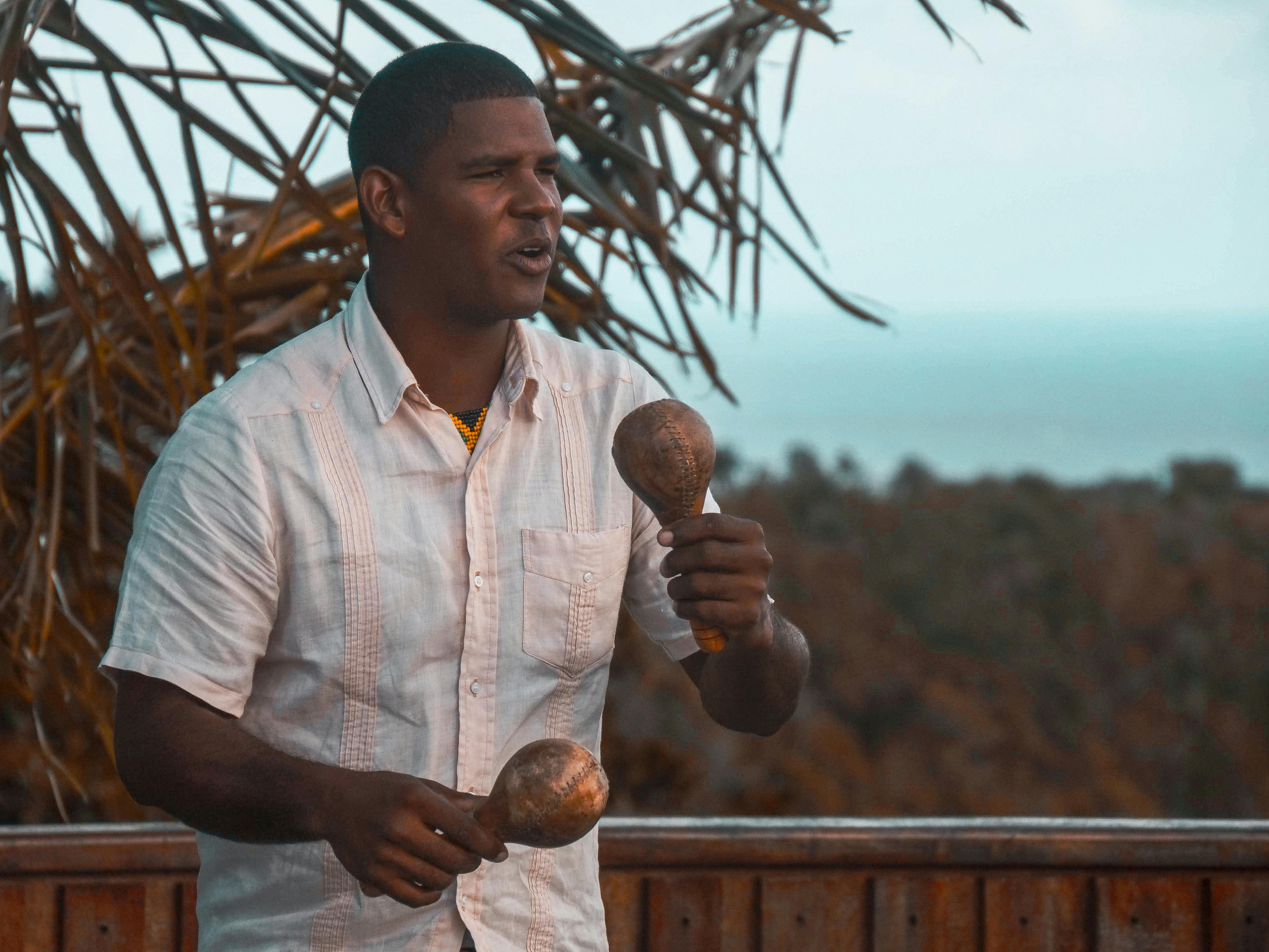 A Man Playing Maracas · Free Stock Photo