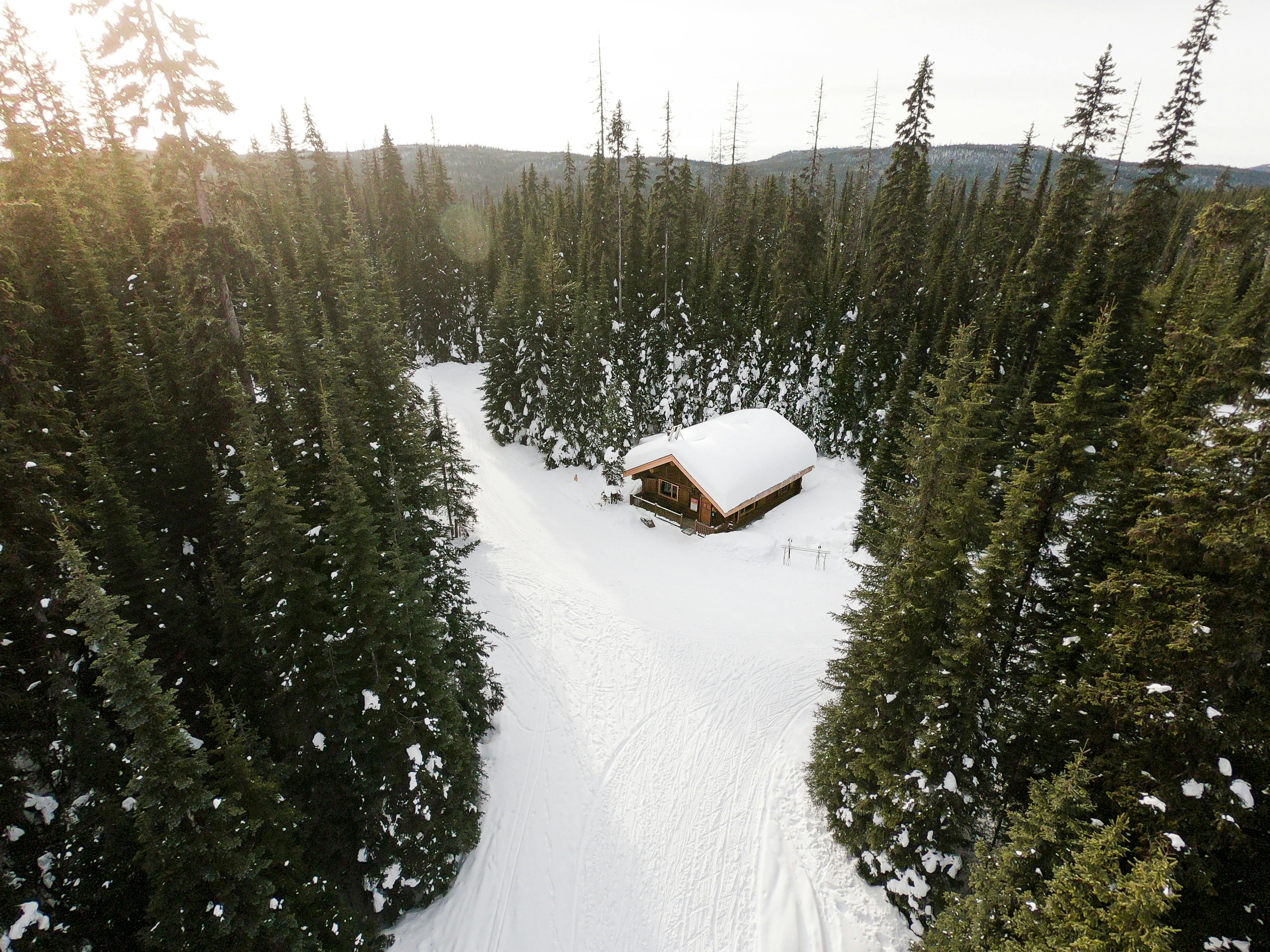 Aerial View of Cabin Covered with Snow · Free Stock Photo