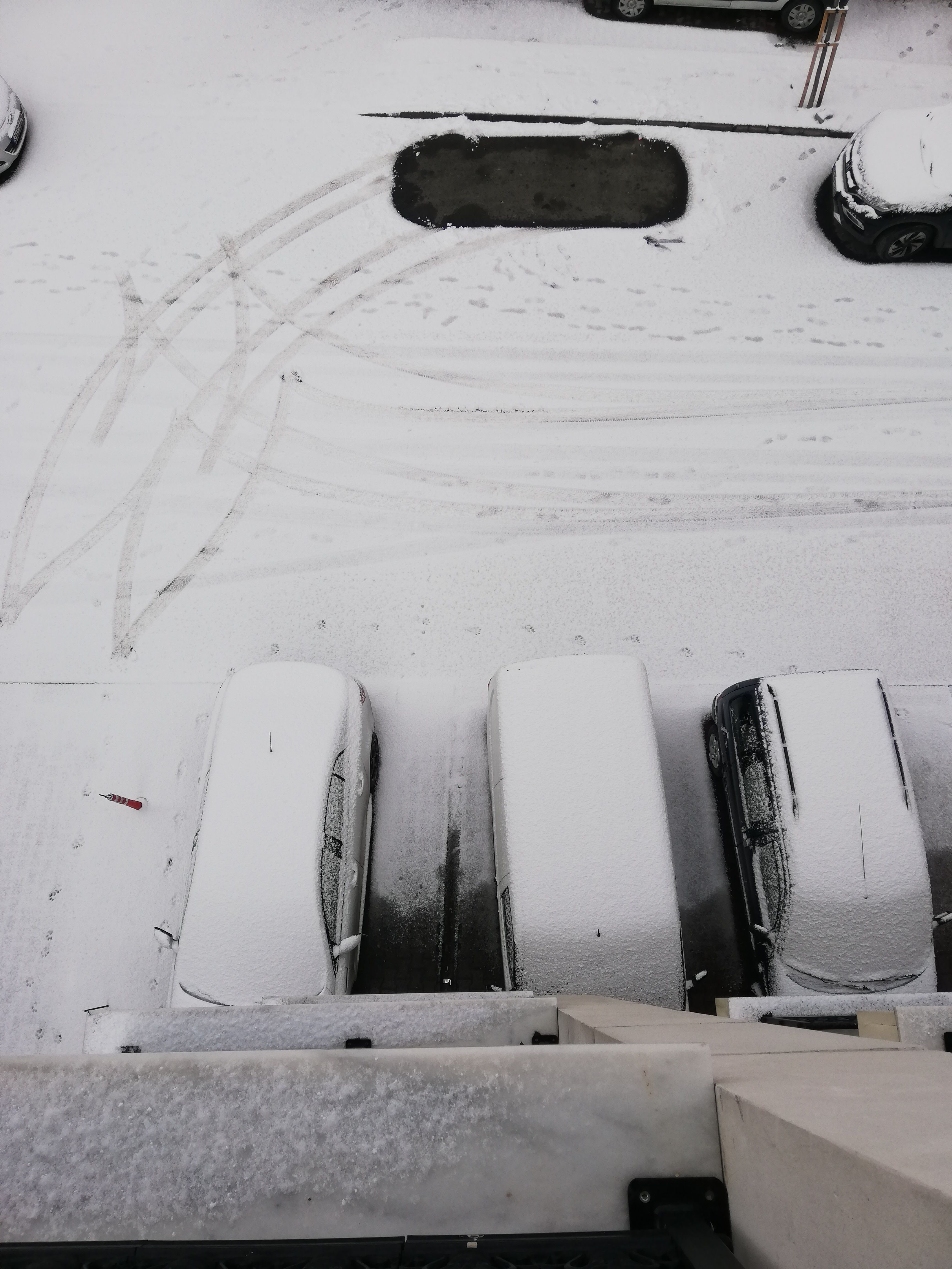 Top View of Snow on Top of Three Cars · Free Stock Photo