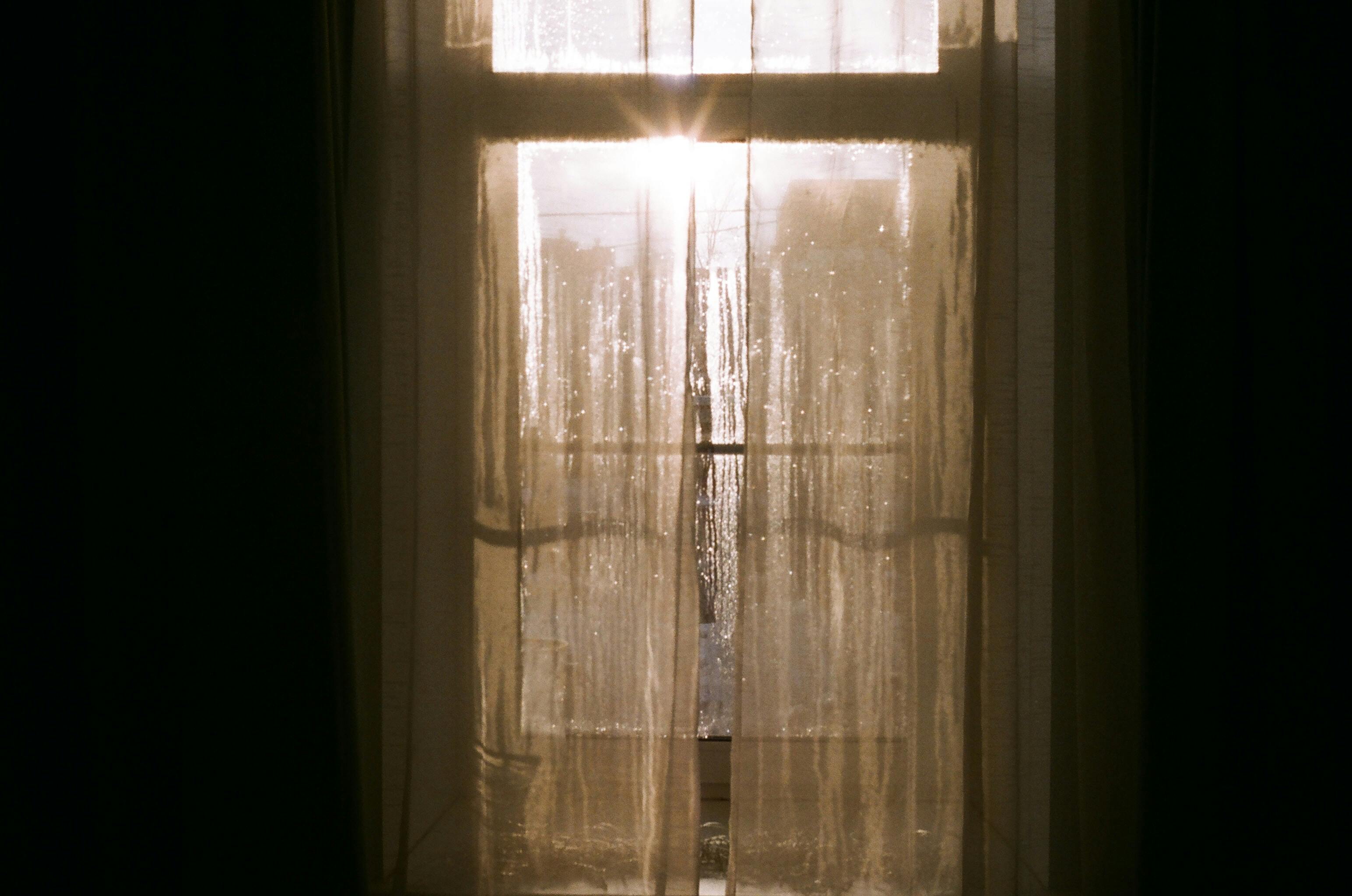 Photo of a Window with a Curtain · Free Stock Photo
