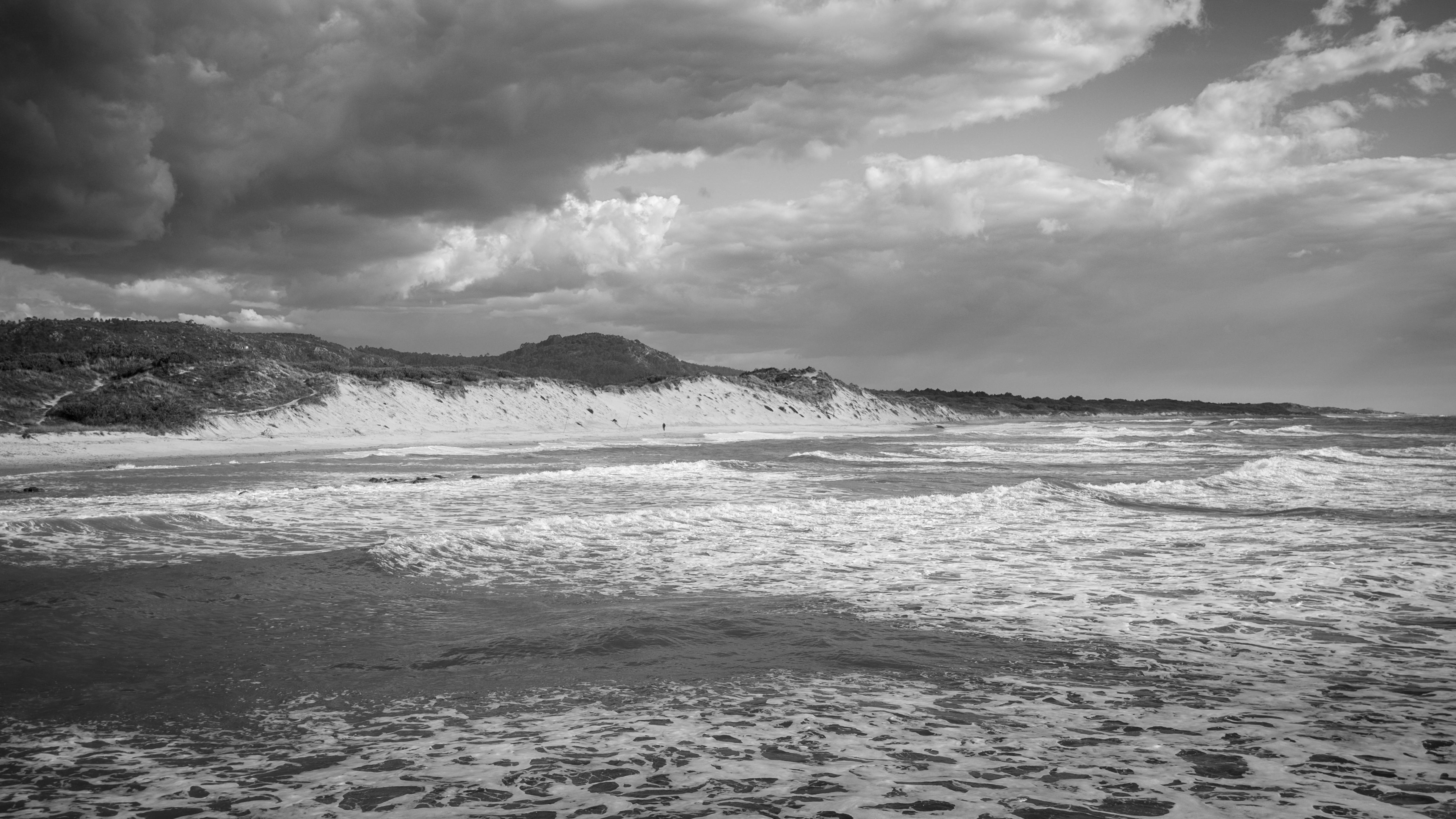 Grayscale Photo of a Body of Water · Free Stock Photo