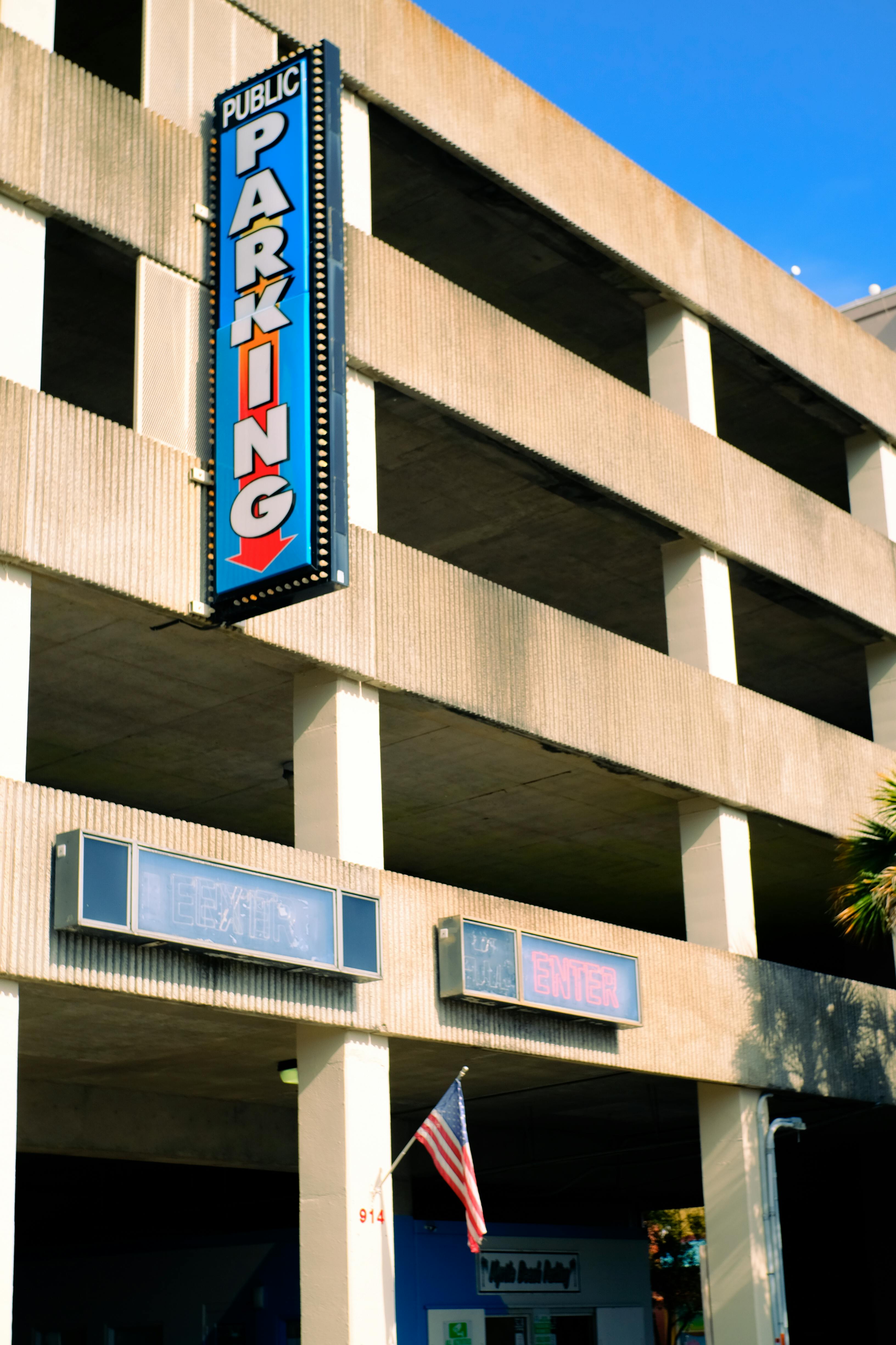 A Signage on a Concrete Building · Free Stock Photo