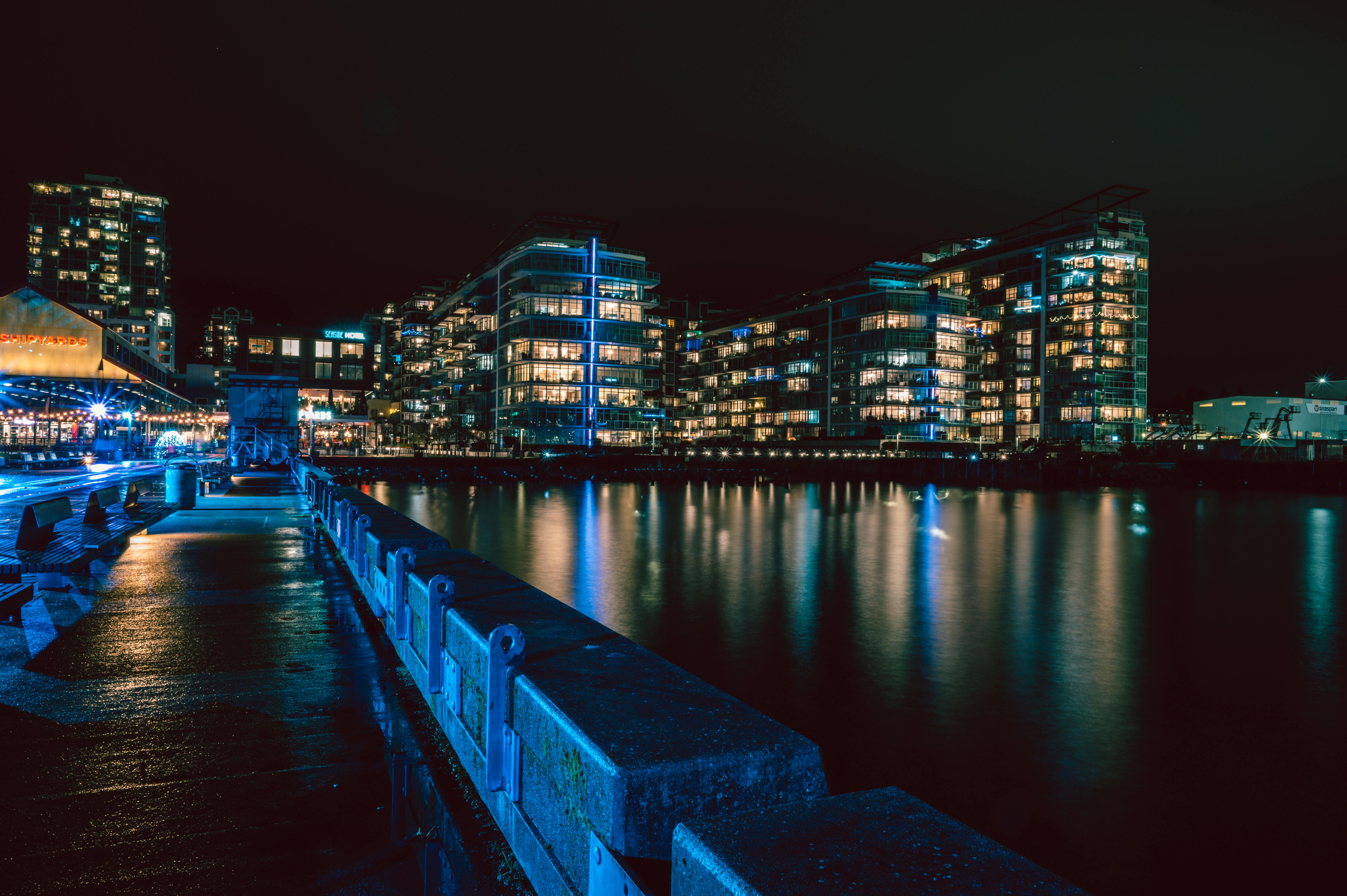 City Buildings During Night Time · Free Stock Photo