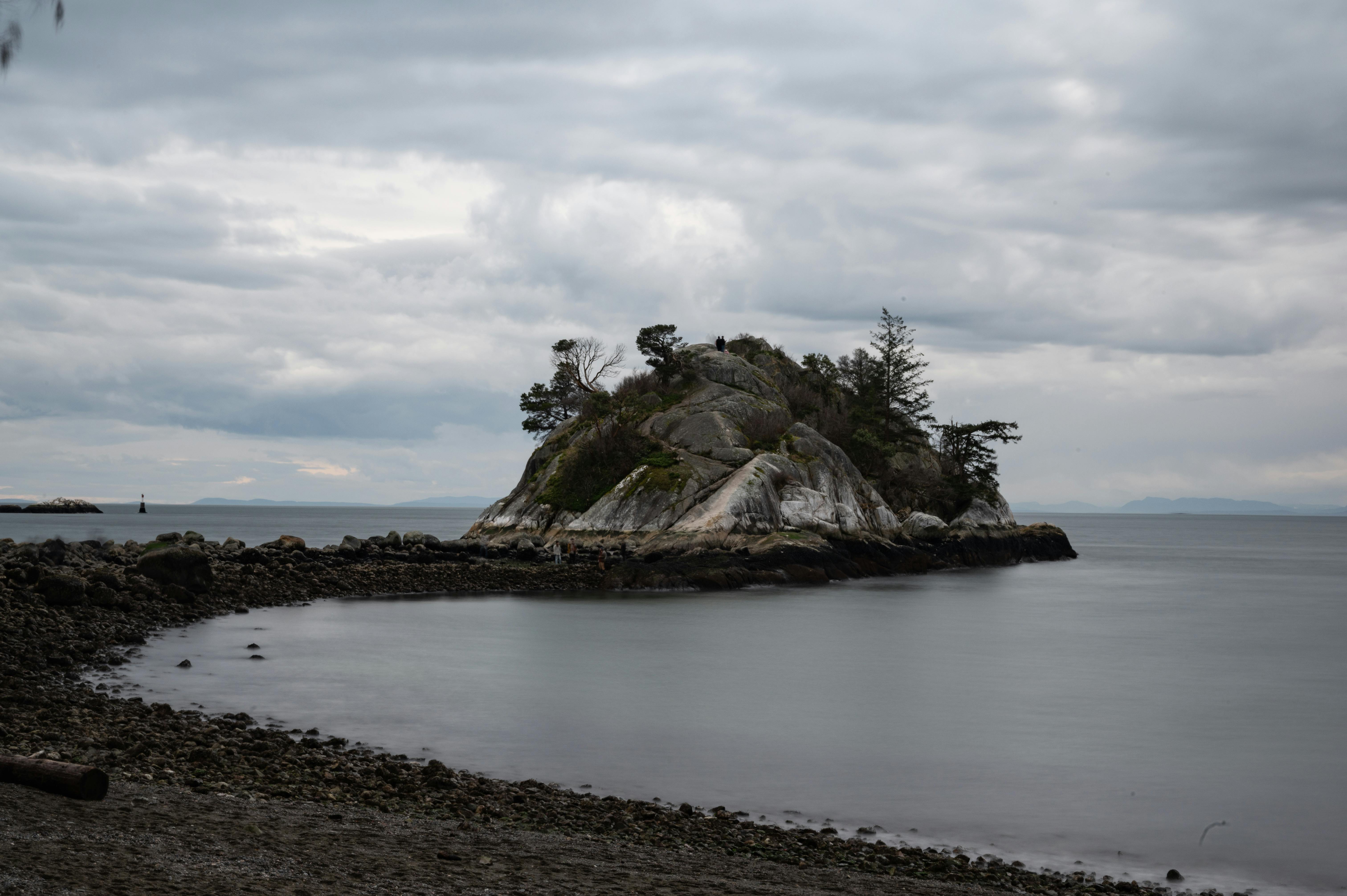 A Bridge on Brown Rock Formation · Free Stock Photo
