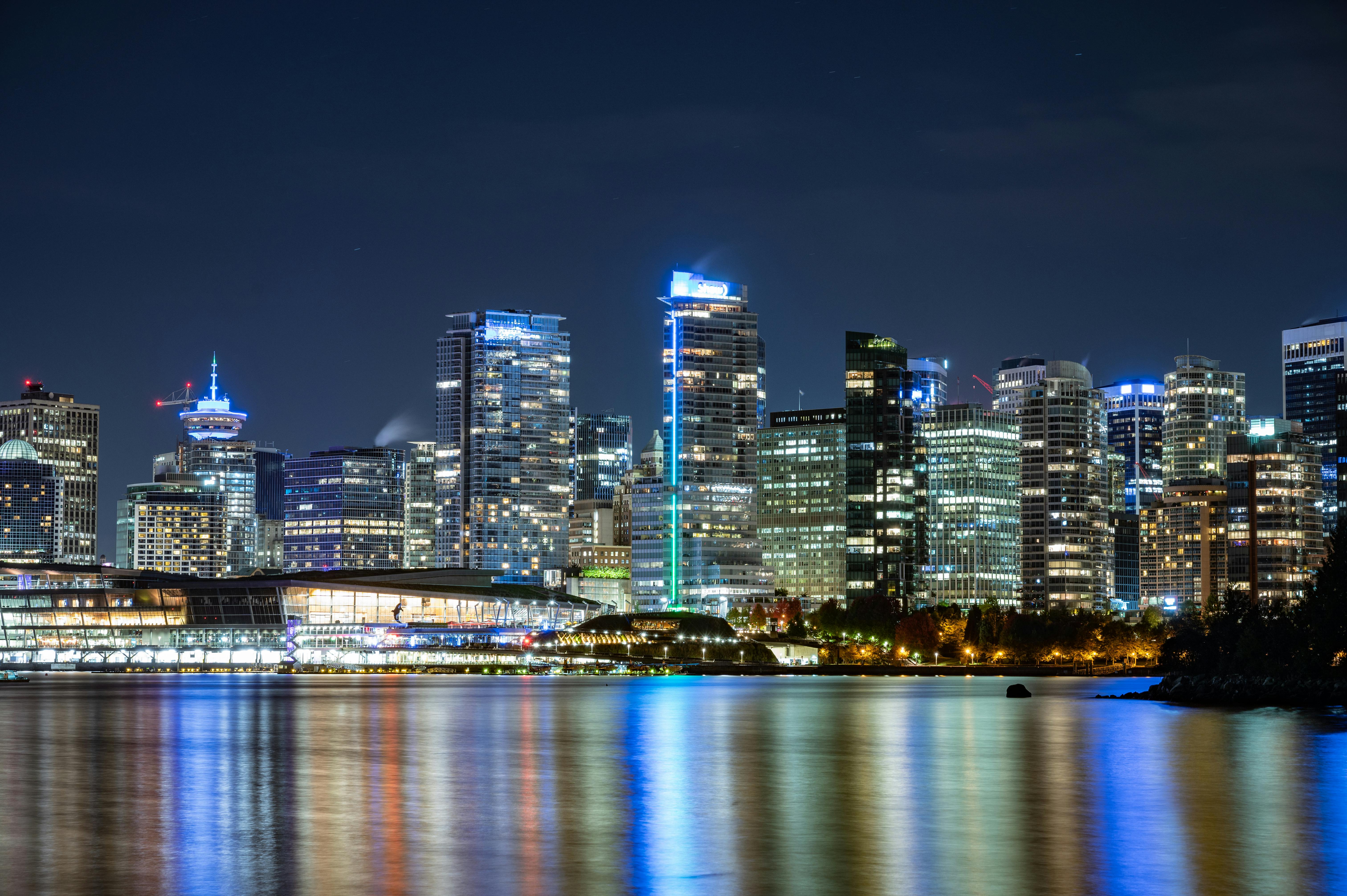 City Buildings During Night Time · Free Stock Photo