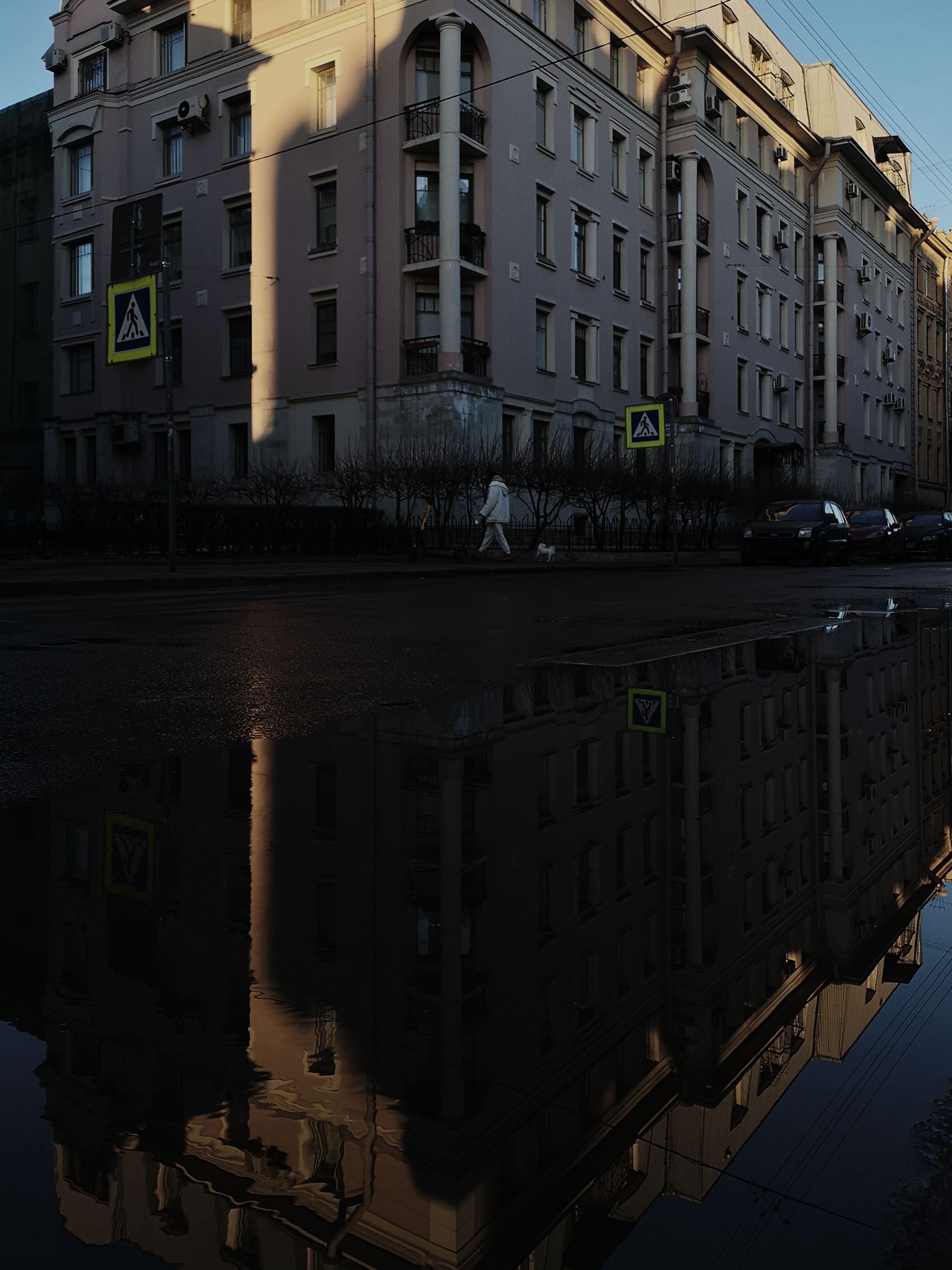 Man Walking Near Buildings · Free Stock Photo