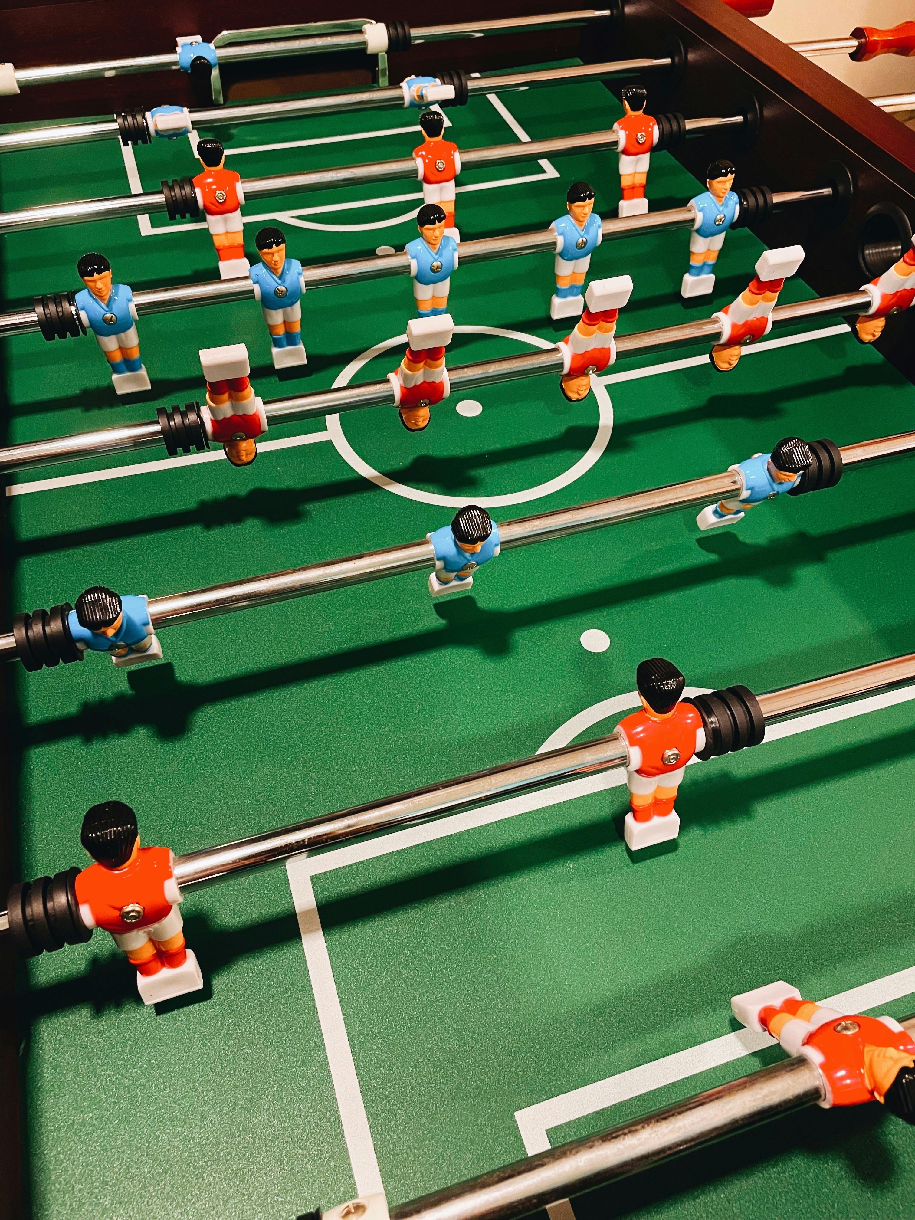 Selective Focus Photography of Foosball Table · Free Stock Photo