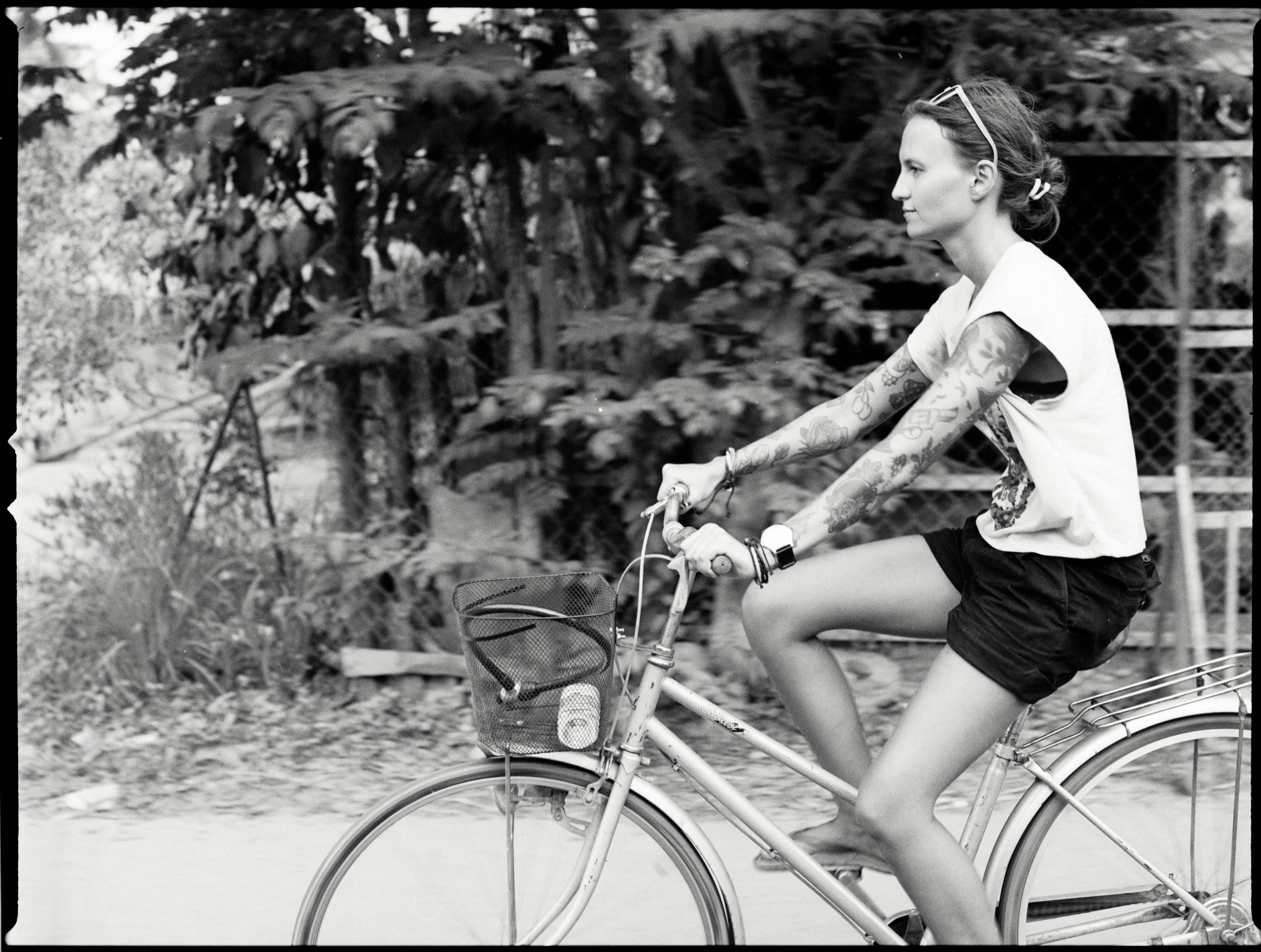Black and White Photo of Woman Riding a Bicycle · Free Stock Photo