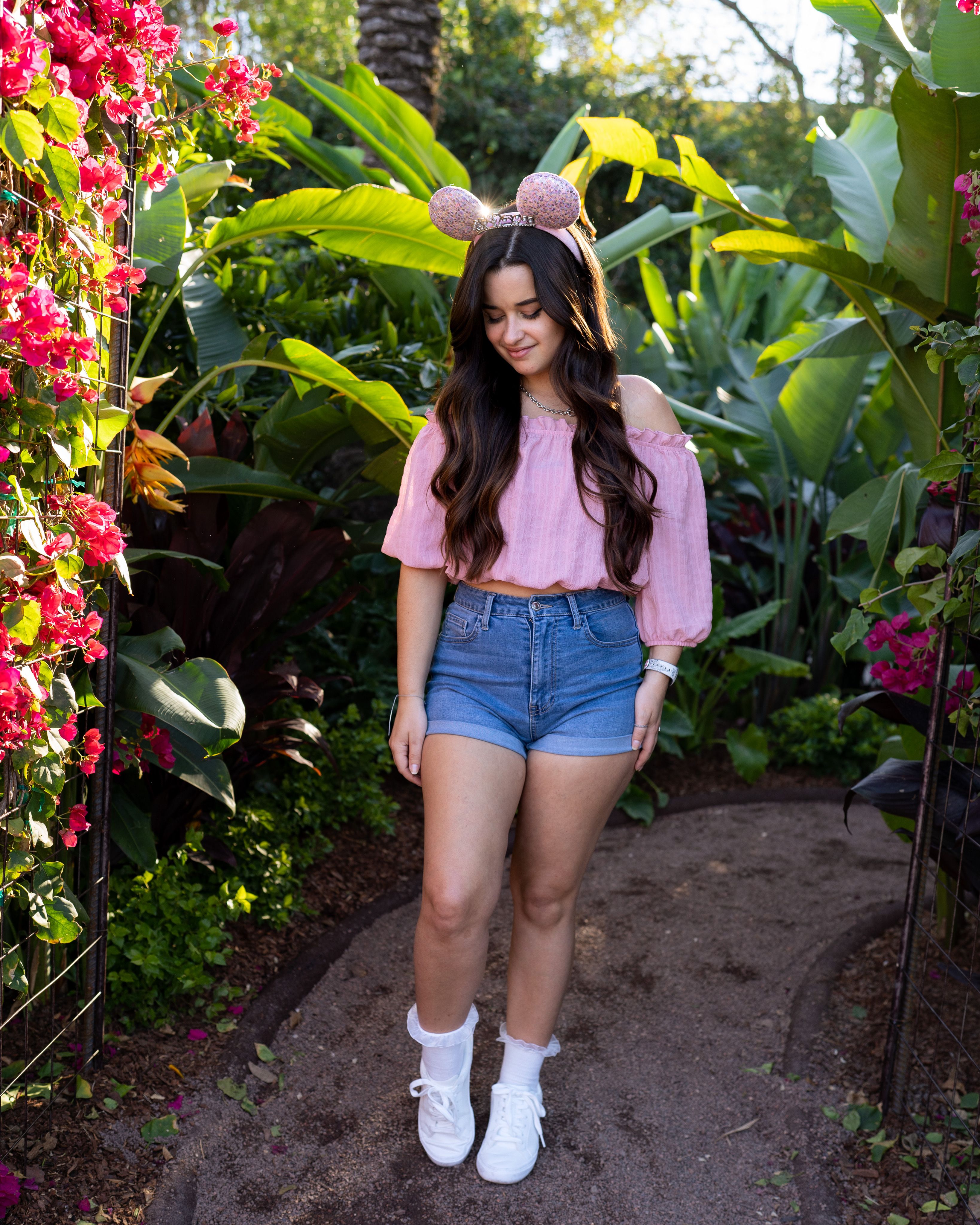 Girl Wearing a White Off Shoulder Top and Denim Shorts · Free Stock Photo