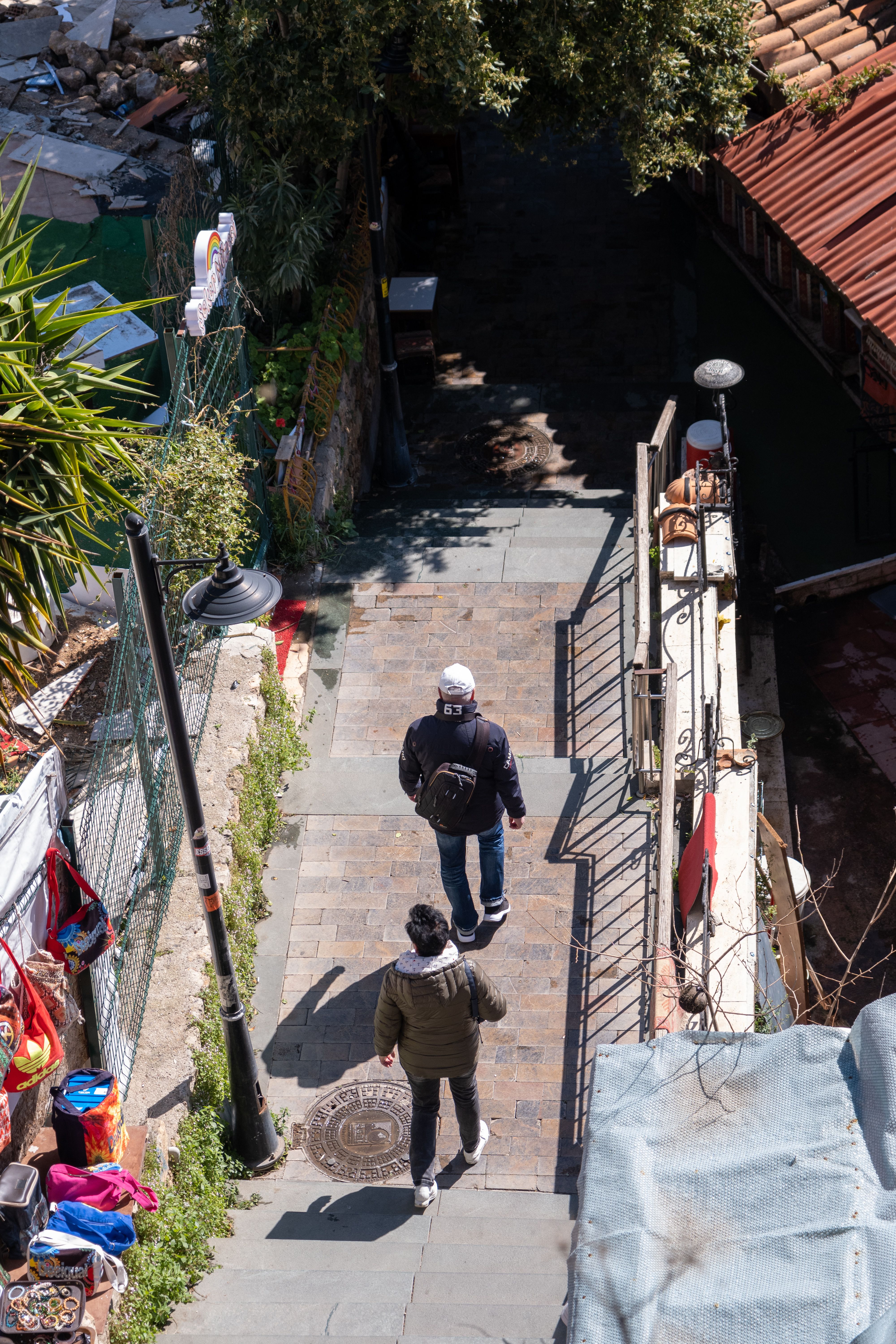High Angle View of Pedestrians Walking down the Sidewalk · Free Stock Photo