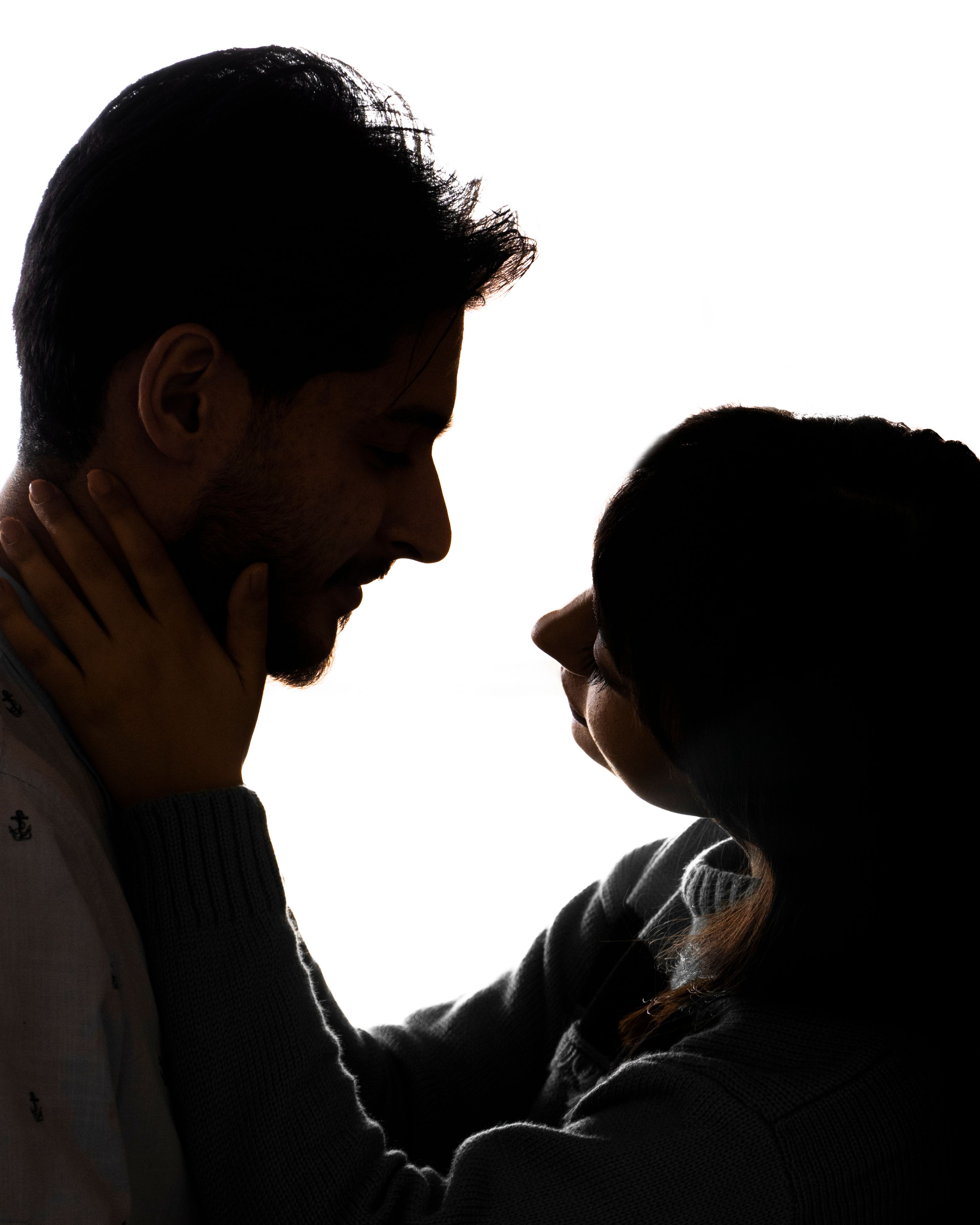 Face to Face of a Romantic Couple on White Background · Free Stock Photo