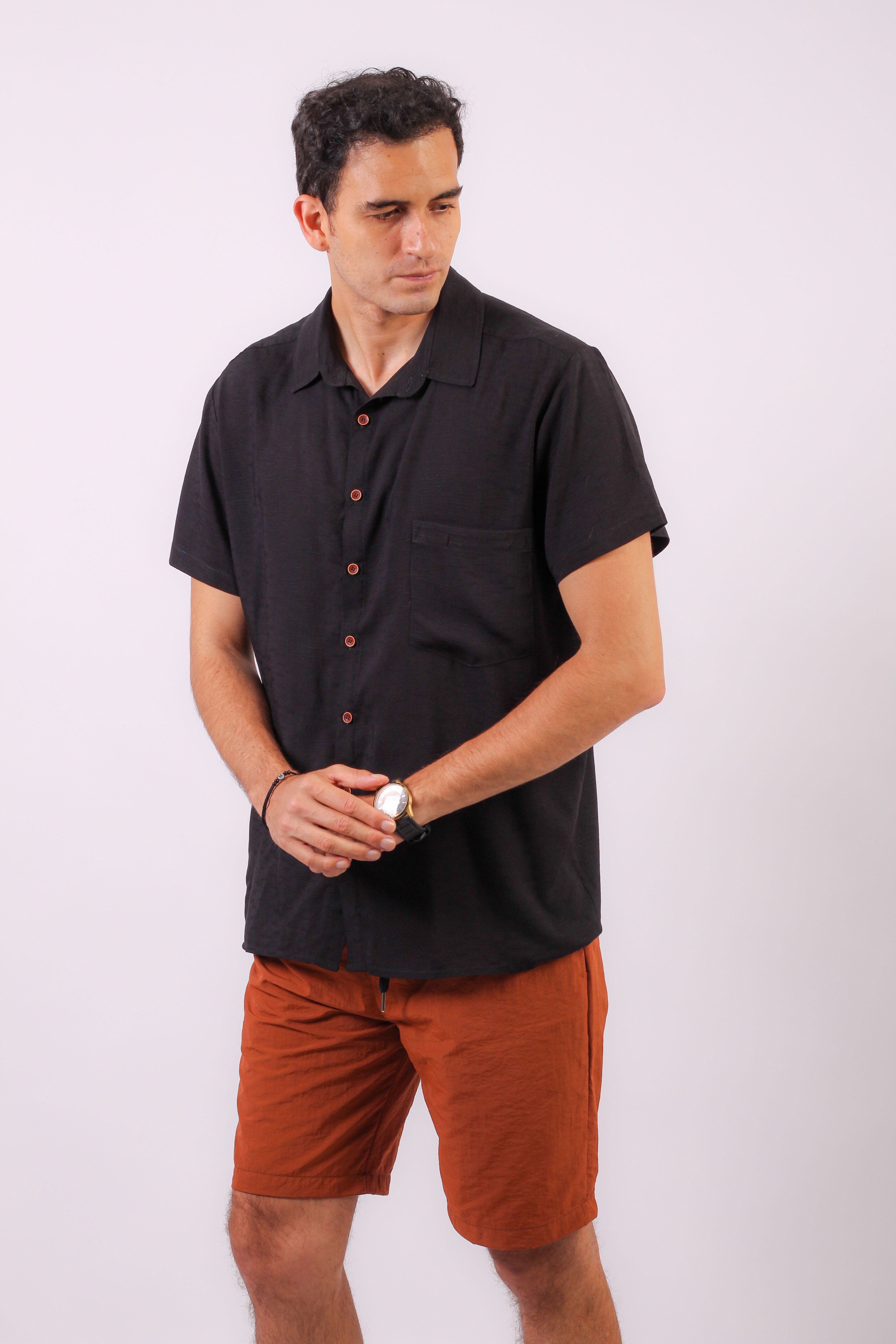 A Man in Button-Up Shirt and Shorts · Free Stock Photo