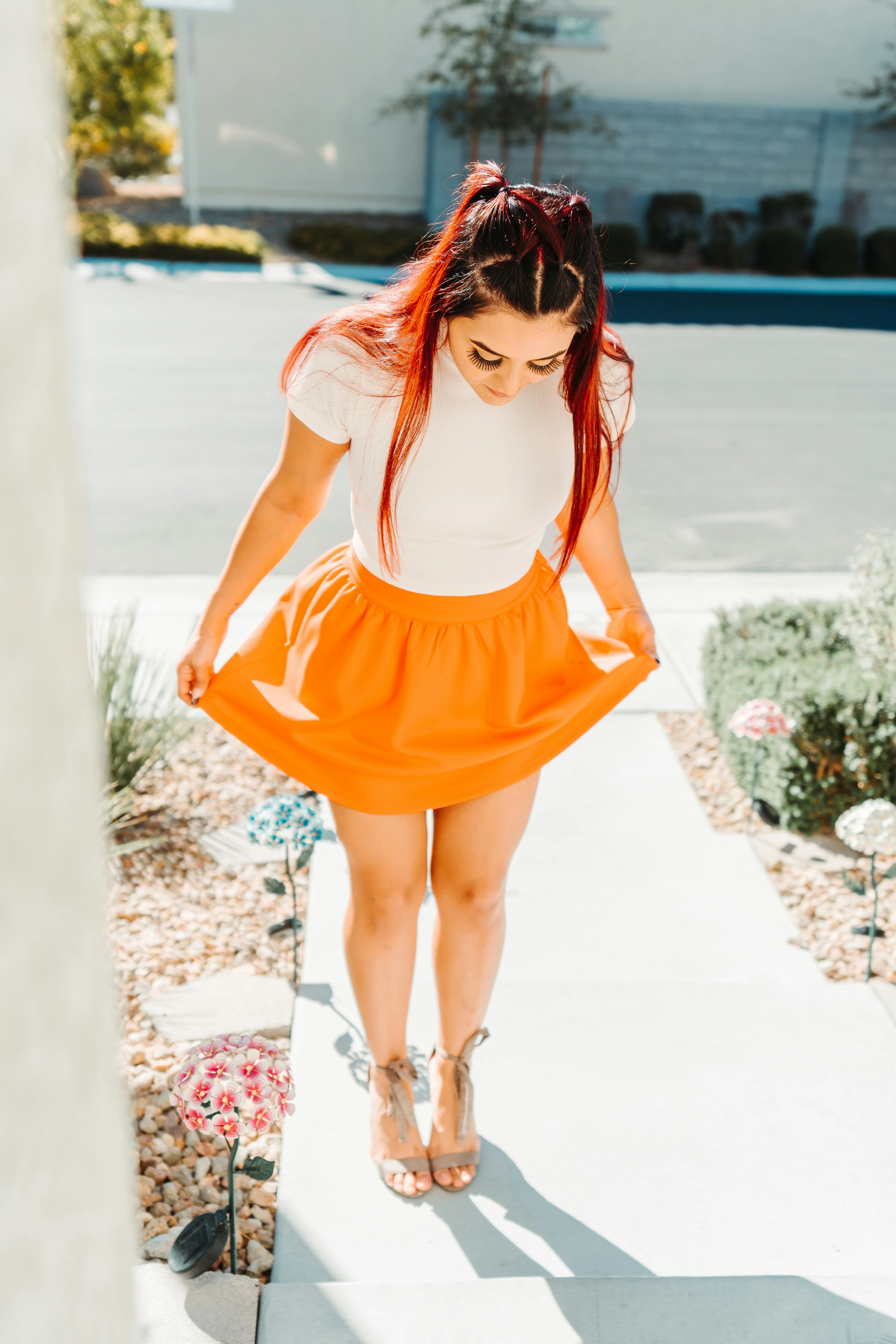 Woman Looking at Her Shadow · Free Stock Photo