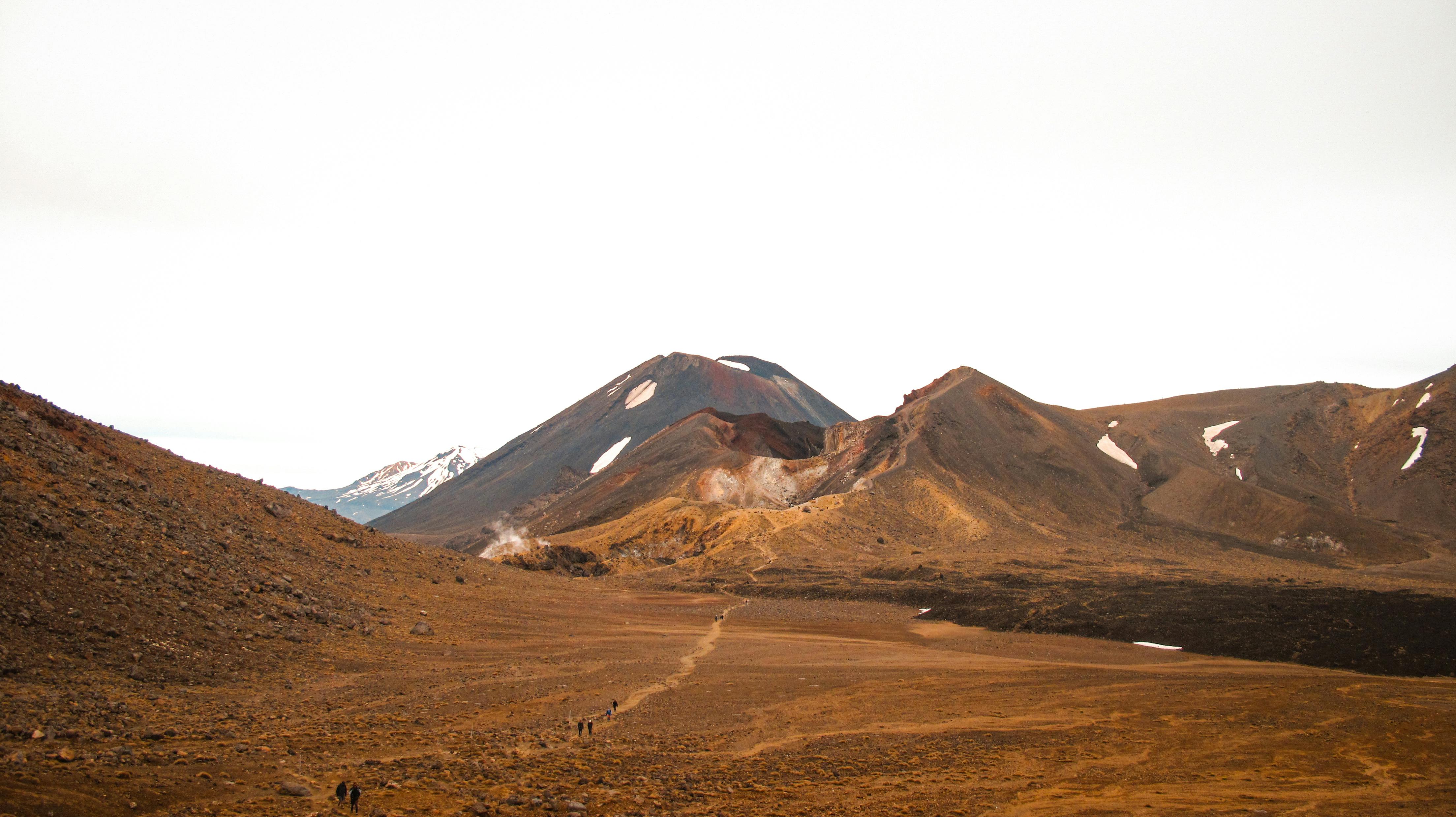 Hikers Walking Near a Volcano · Free Stock Photo