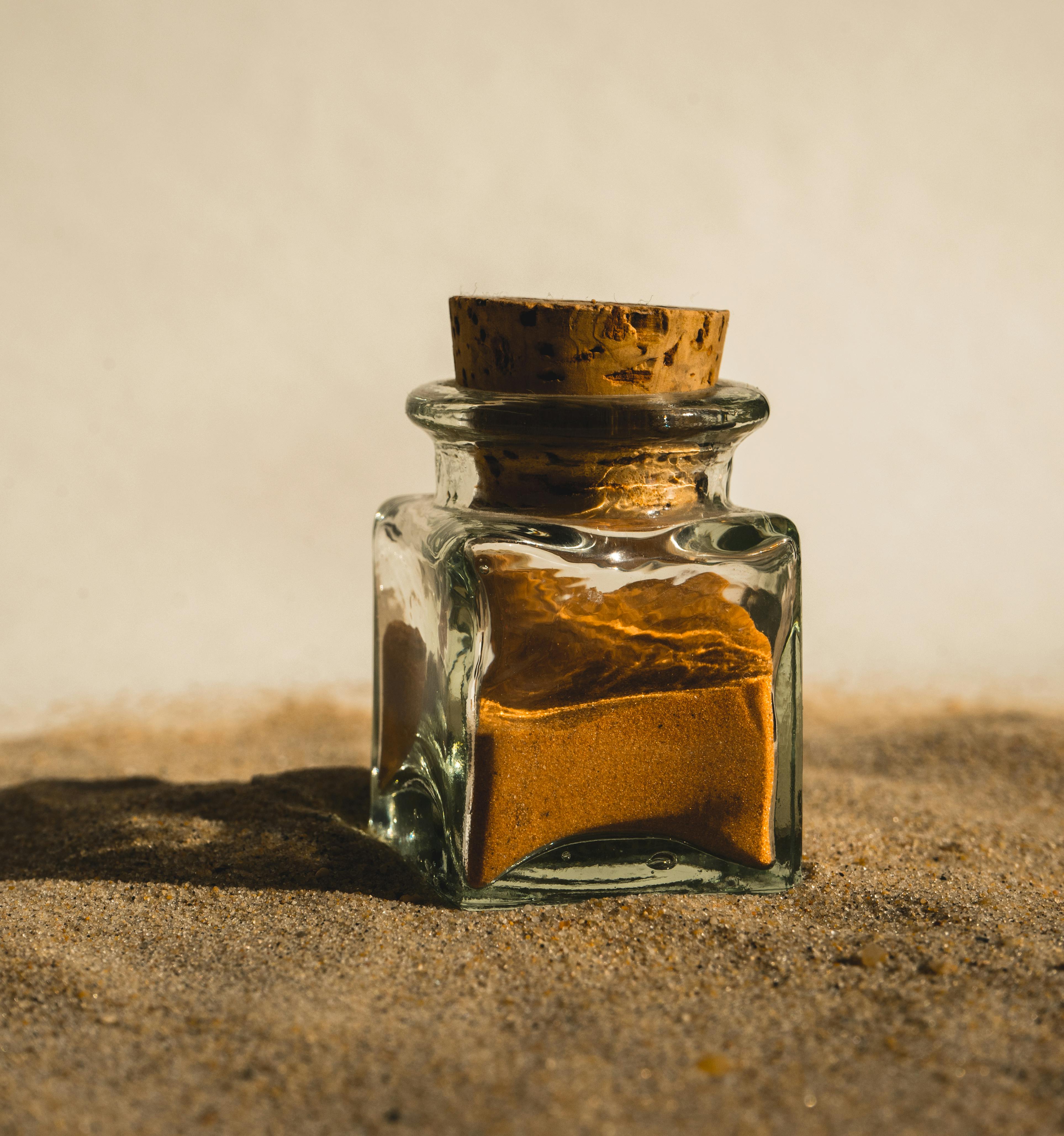 Paper Inside Clear Glass Jar With Brown Cork · Free Stock Photo