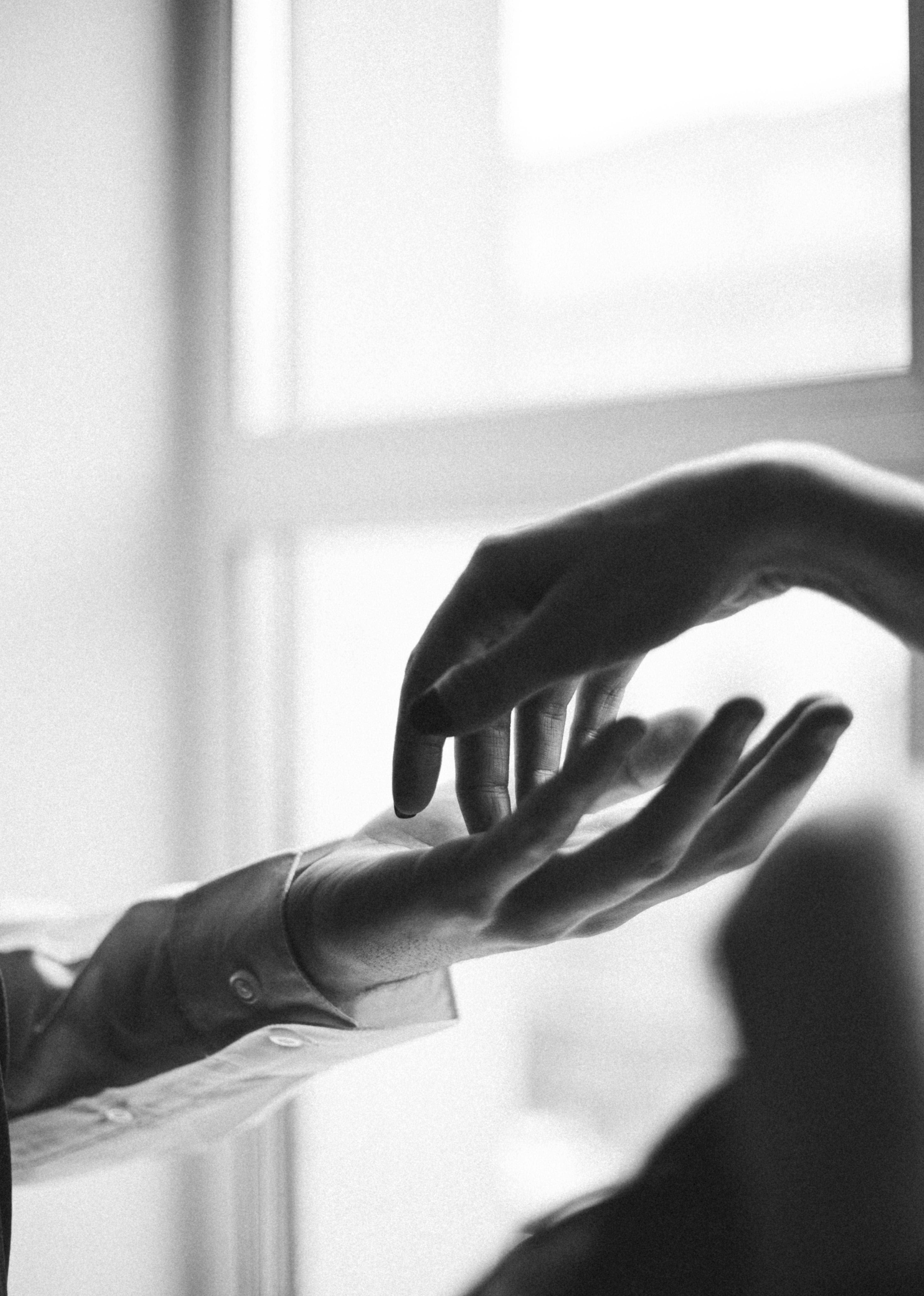 Grayscale Photo of Hands · Free Stock Photo