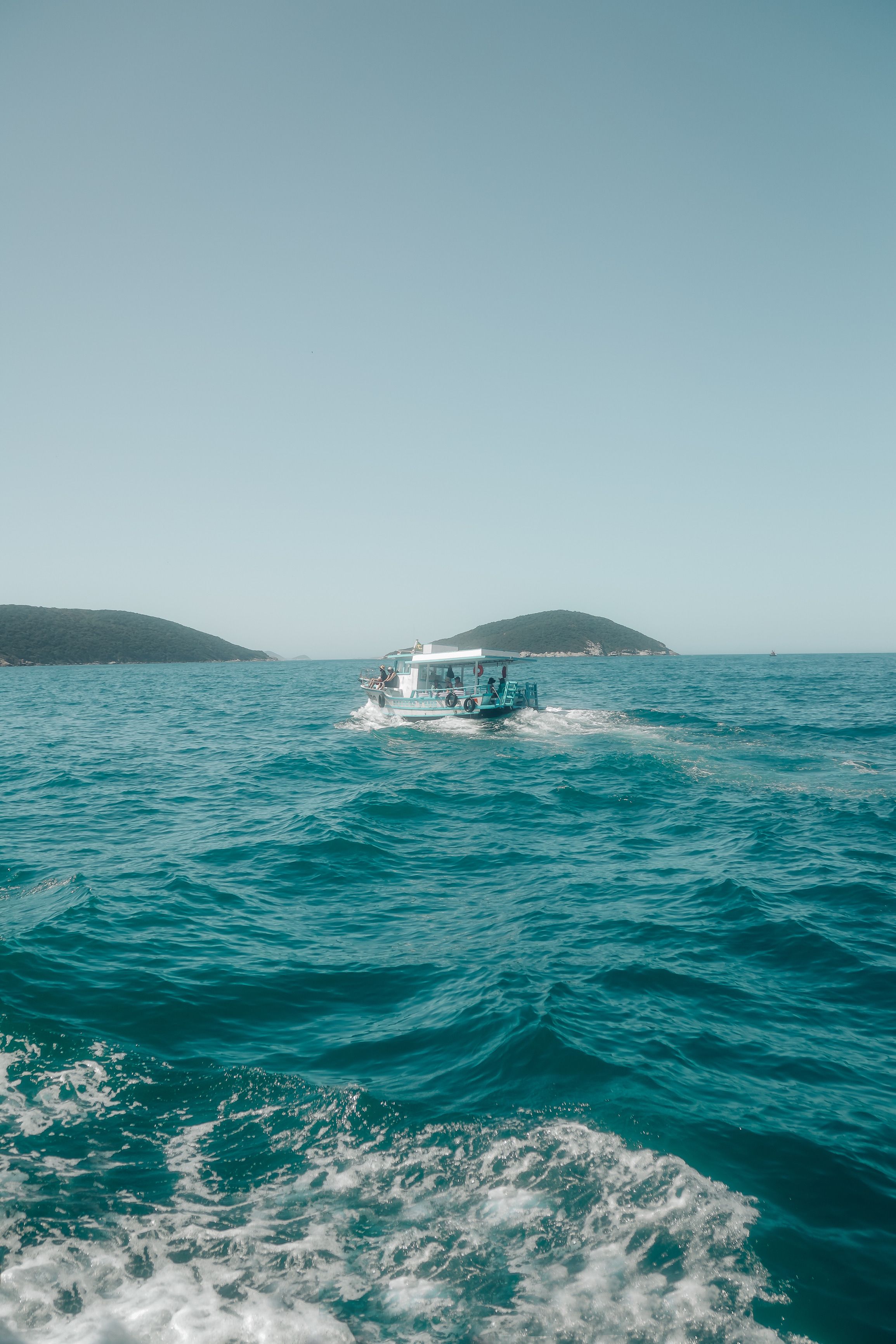 White Boat Cruising the Sea · Free Stock Photo