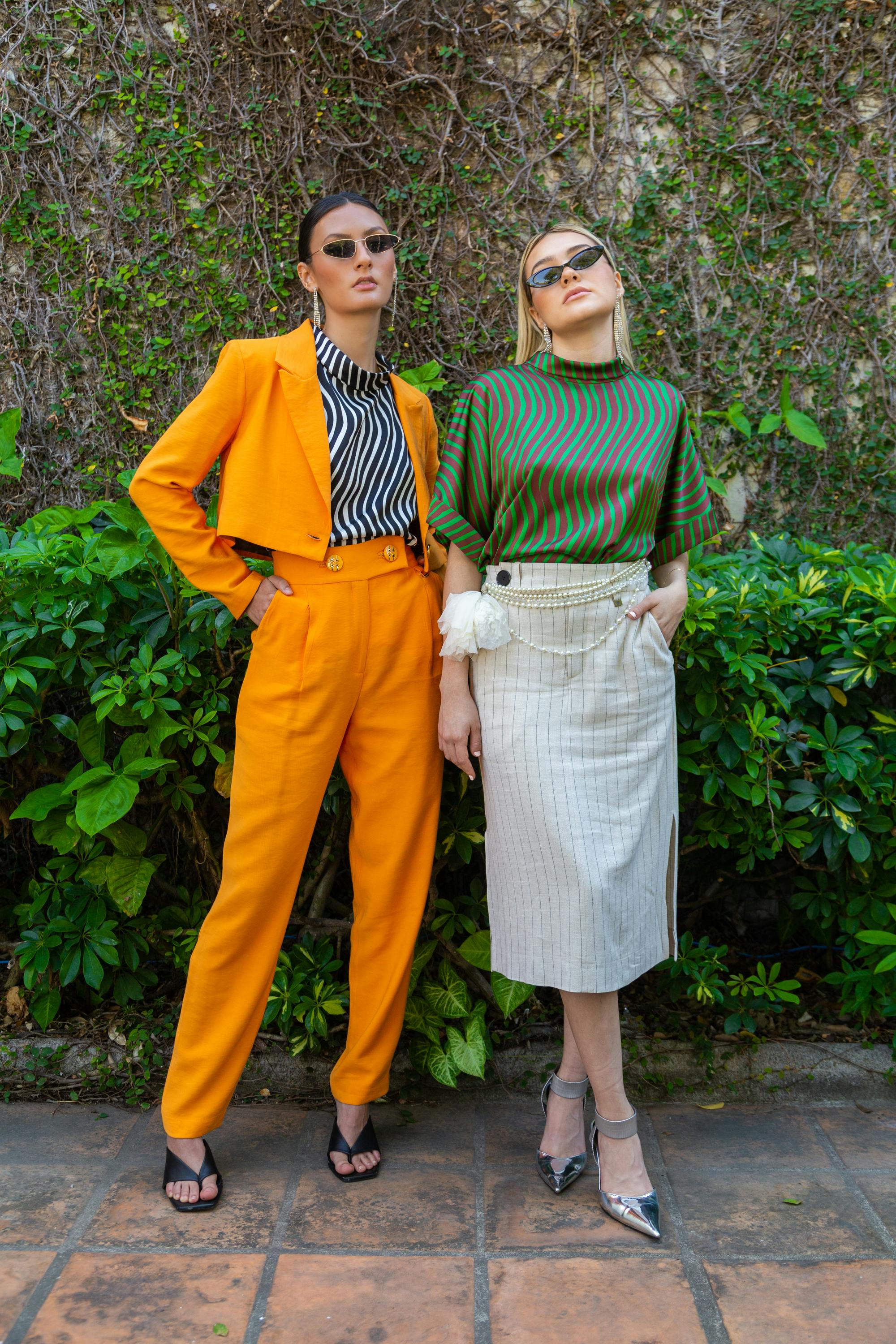 Women in Stylish Outfit Posing · Free Stock Photo