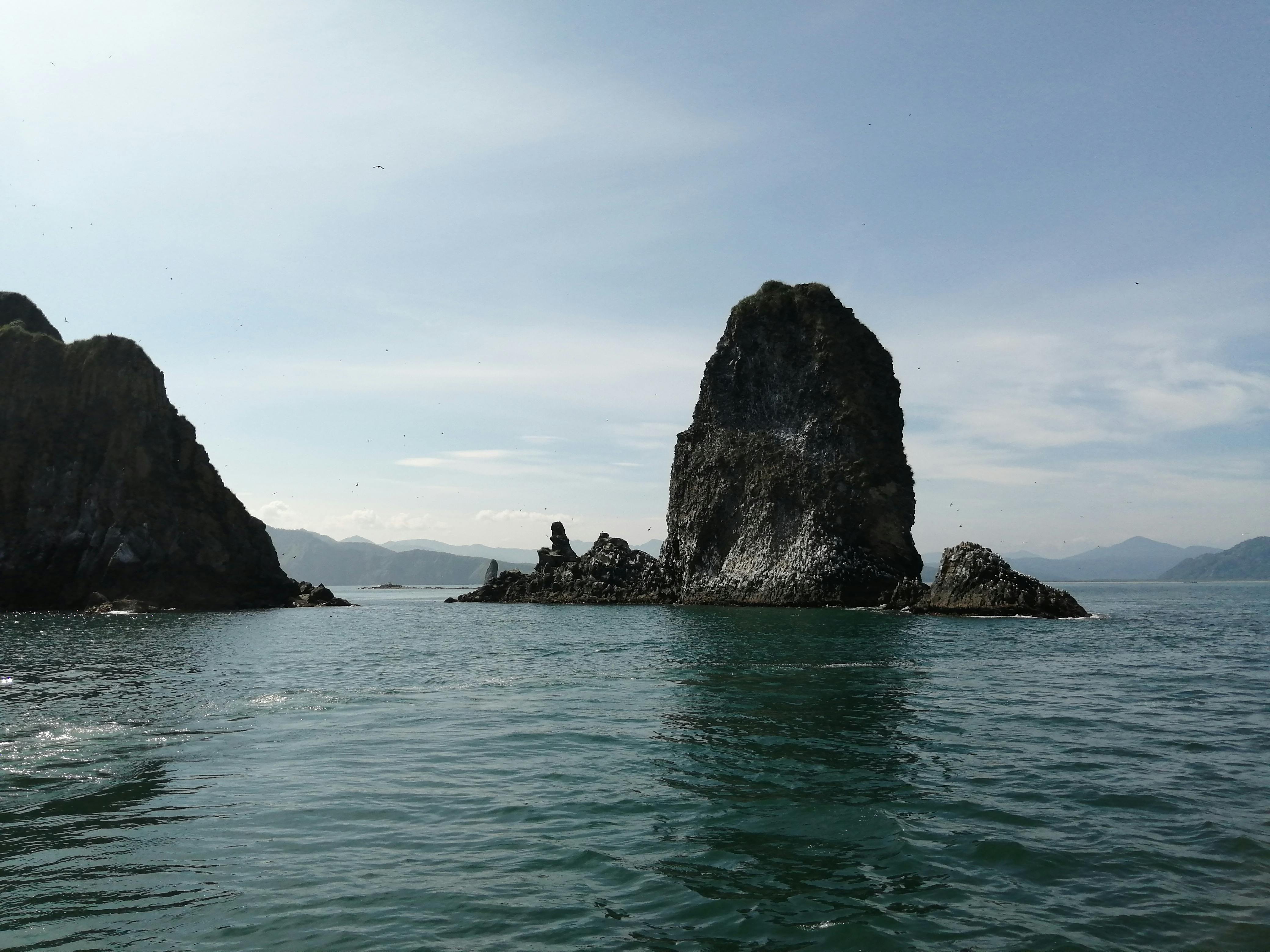 Eroded Rock Formations in Sea · Free Stock Photo